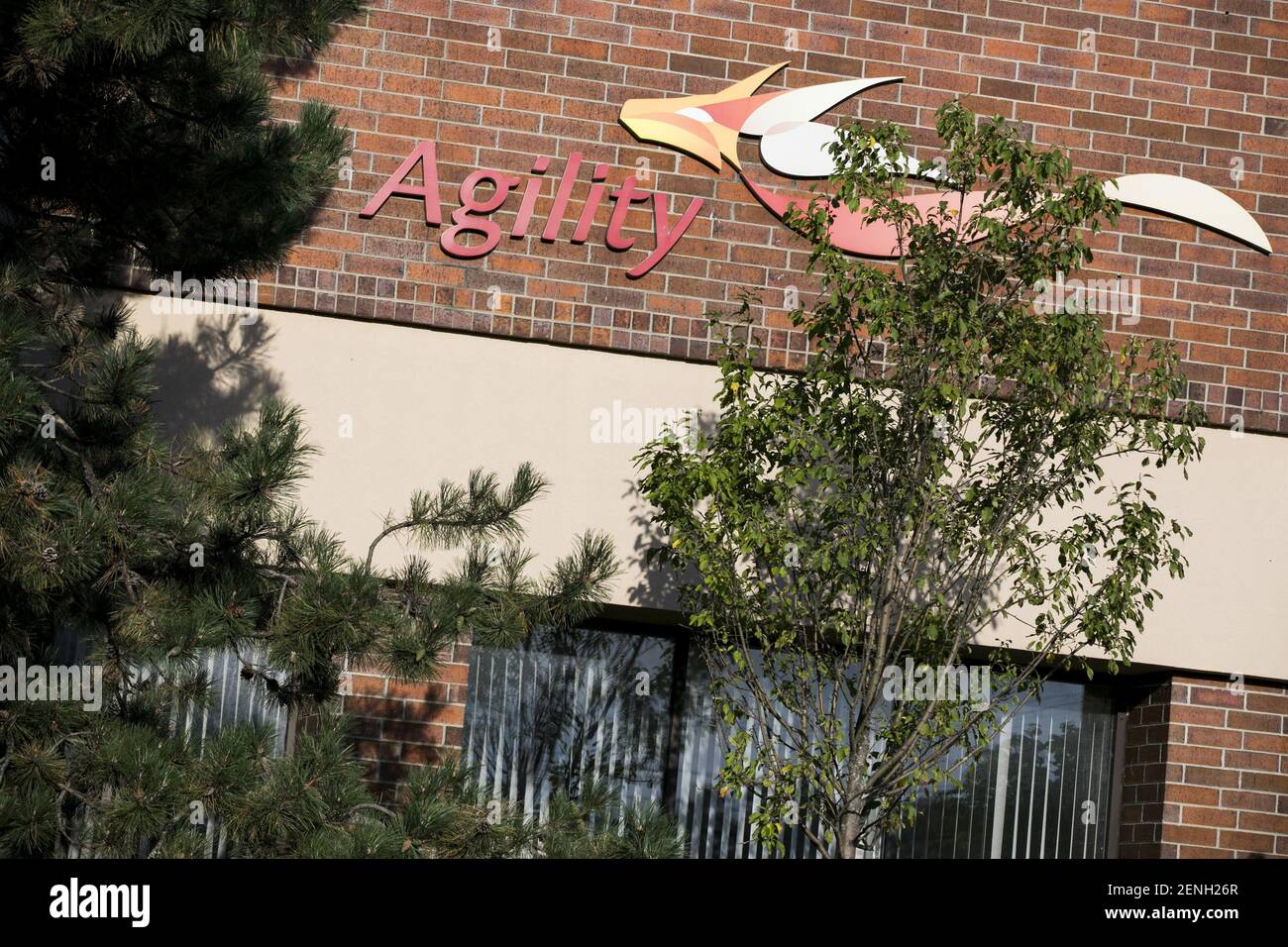 A logo sign outside of a facility occupied by Agility Logistics in ...