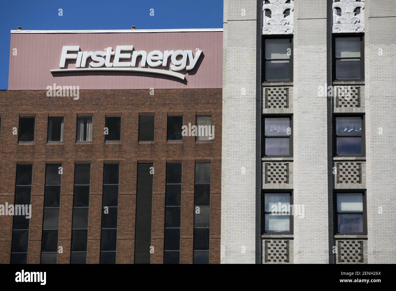 A logo sign outside of the headquarters of FirstEnergy in Akron, Ohio ...