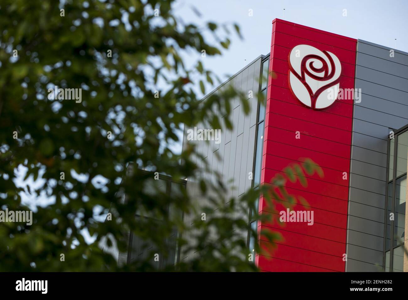A logo sign outside of the headquarters of the American Greetings ...