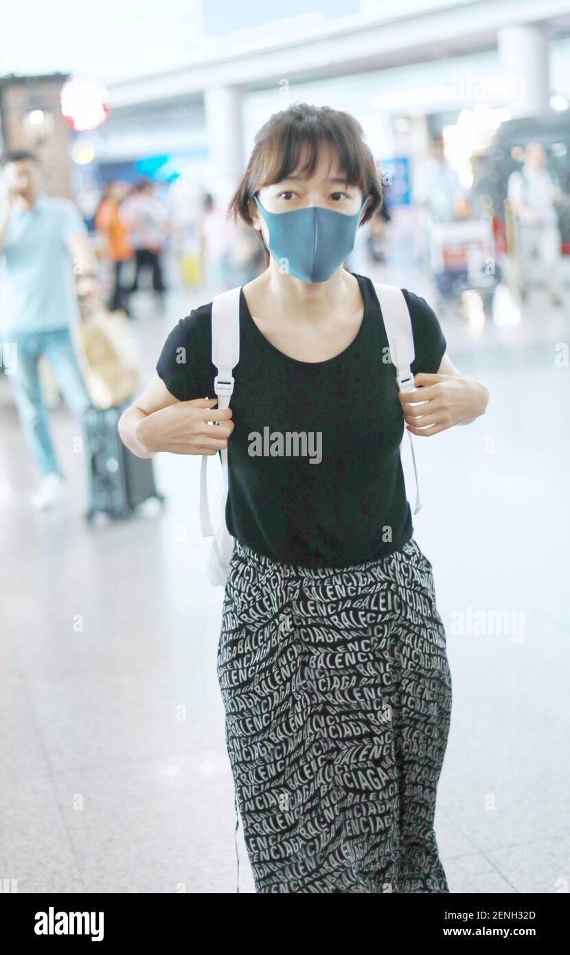 Chinese actress Jiao Junyan arrives at the Beijing Capital ...