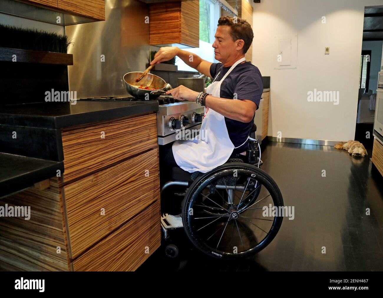 Master Chef Latino John Pardo of Miami prepares a pasta dish in his ...