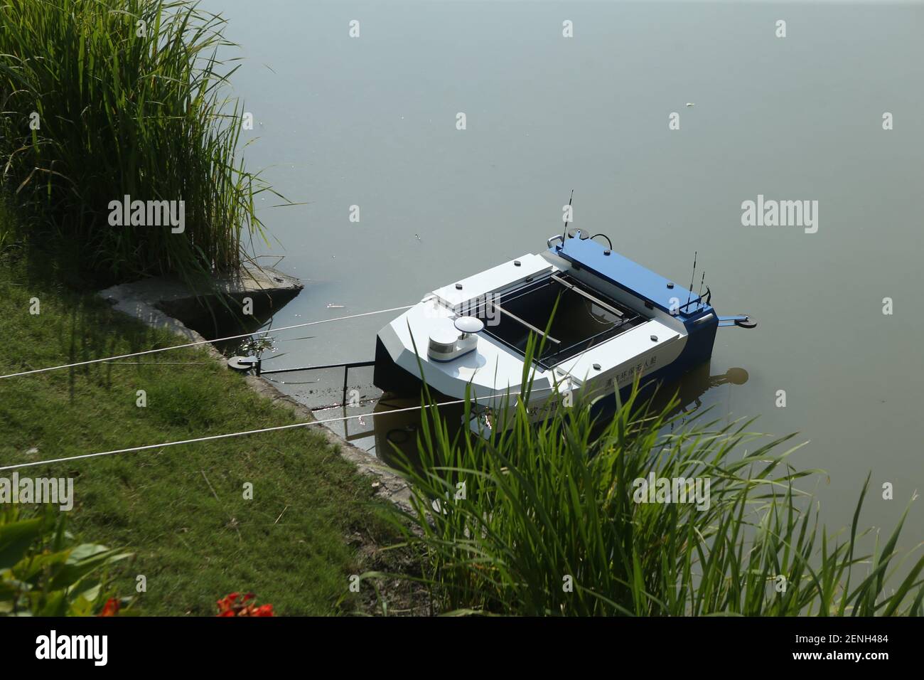 A remote-controlled unmanned vessel able to collect garbage from water ...