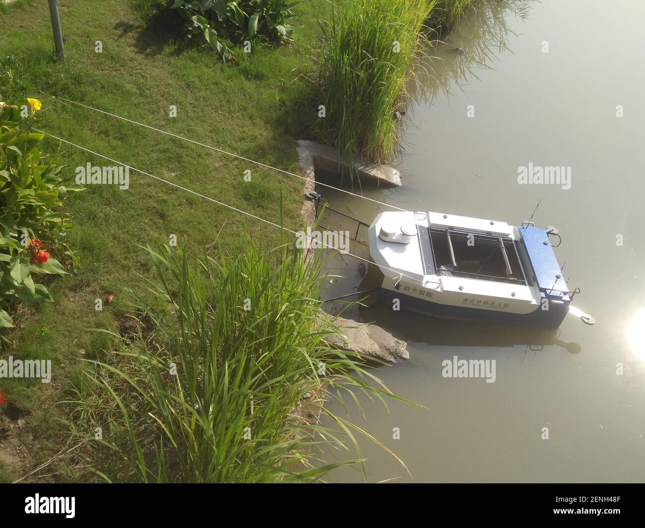 A remote-controlled unmanned vessel able to collect garbage from water ...