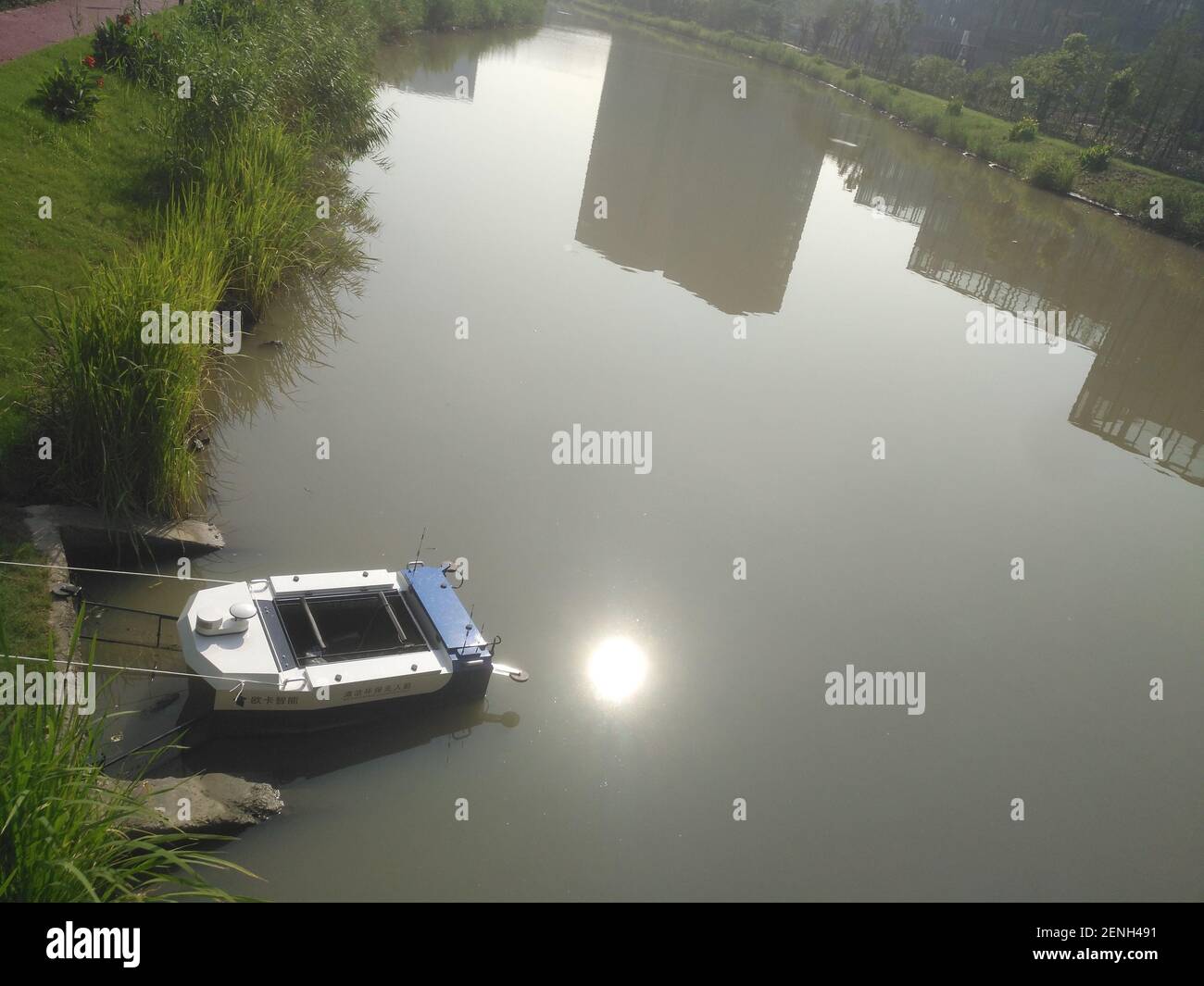 A remote-controlled unmanned vessel able to collect garbage from water ...