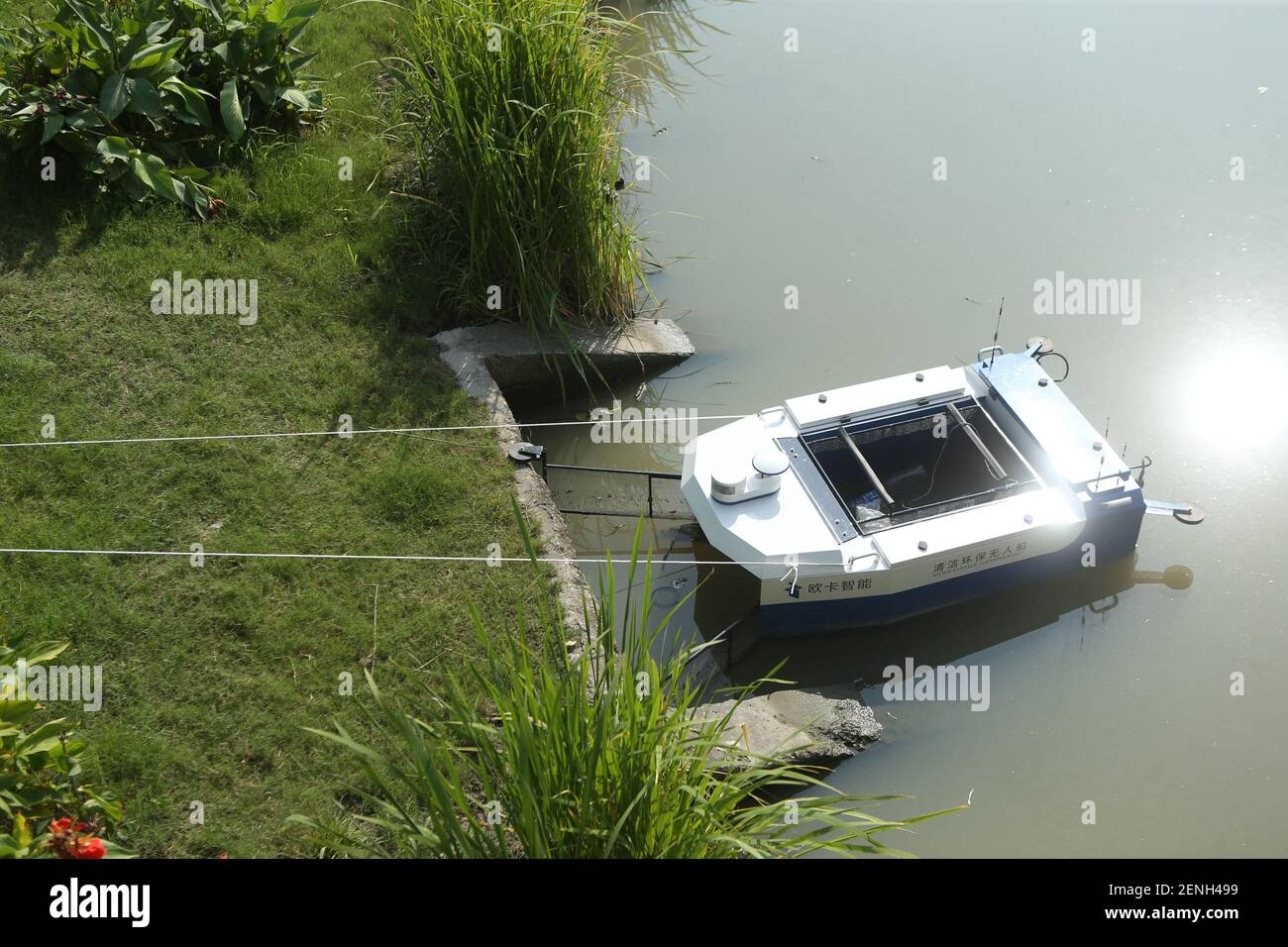 A remote-controlled unmanned vessel able to collect garbage from water ...