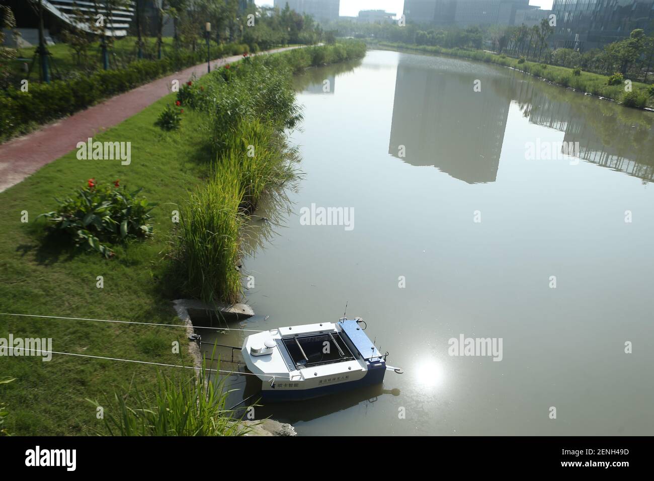A remote-controlled unmanned vessel able to collect garbage from water ...