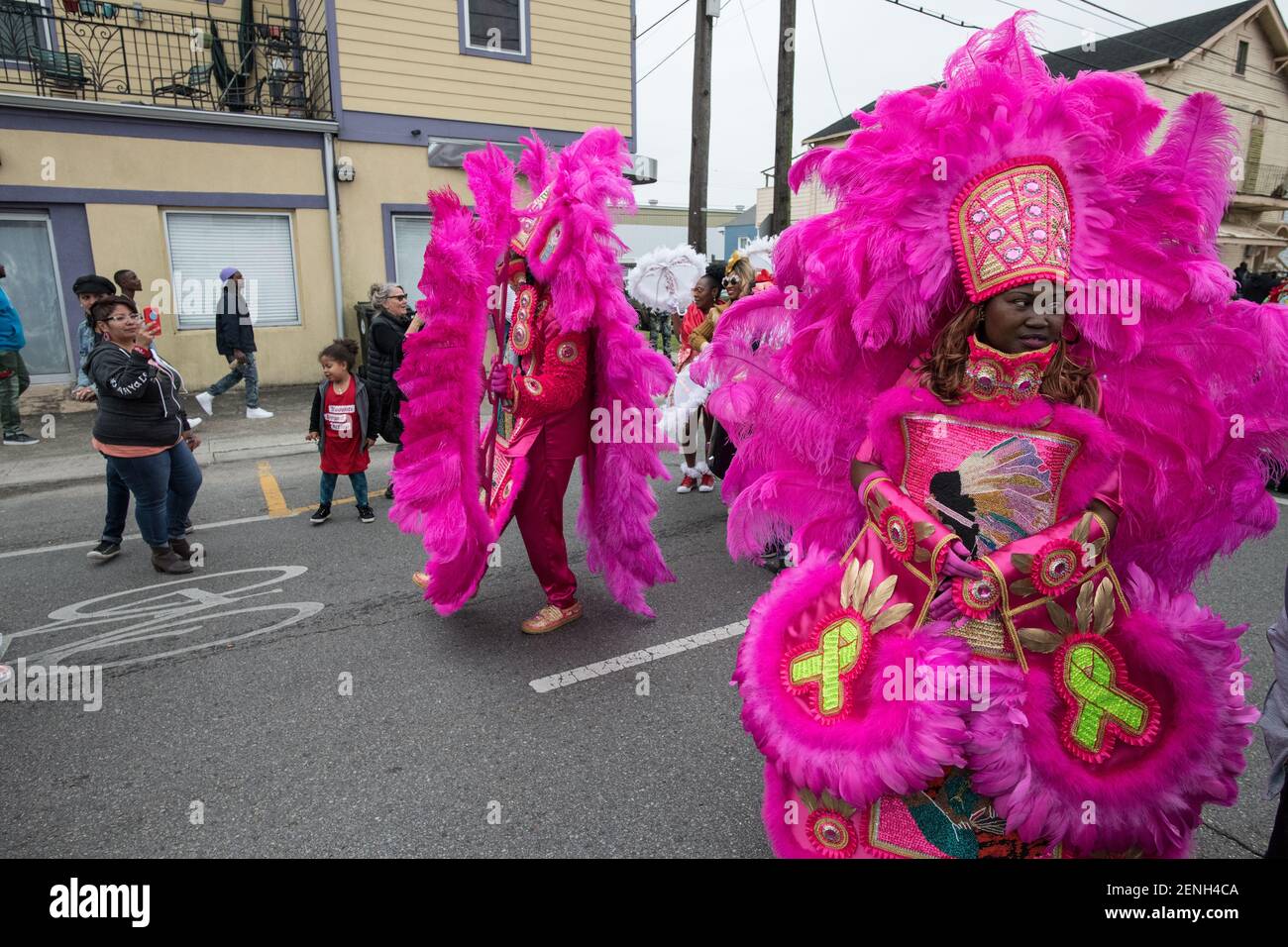 Black Masking Indians (Mardi Gras Indians), adorned in vibrant ...