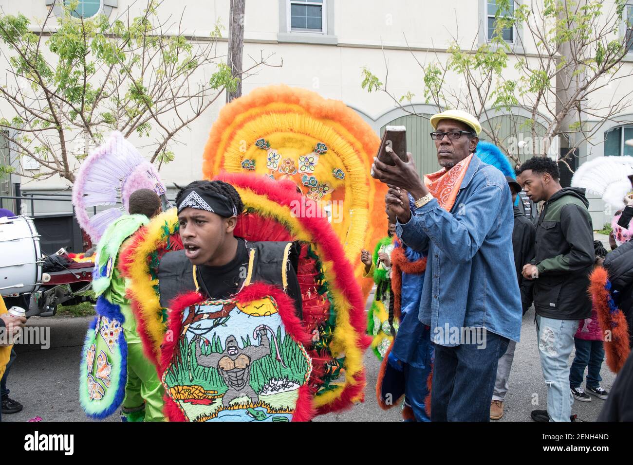 Black Masking Indians (Mardi Gras Indians), adorned in vibrant ...