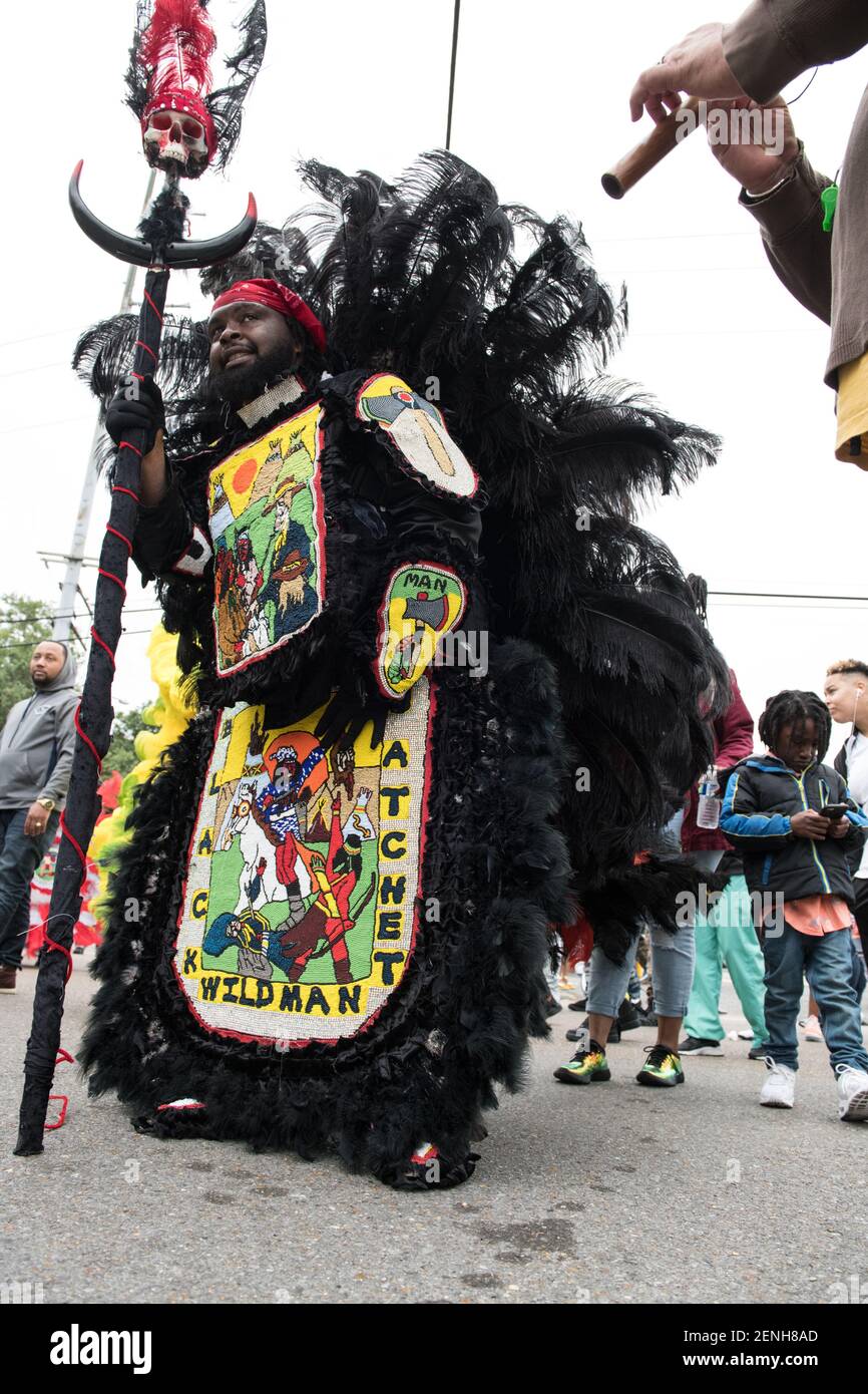 Black Masking Indians (Mardi Gras Indians), adorned in vibrant ...