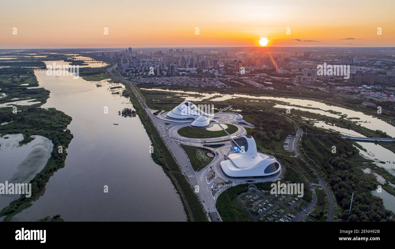 An aerial view at sunset of Harbin Opera House or Harbin Grand Theater ...