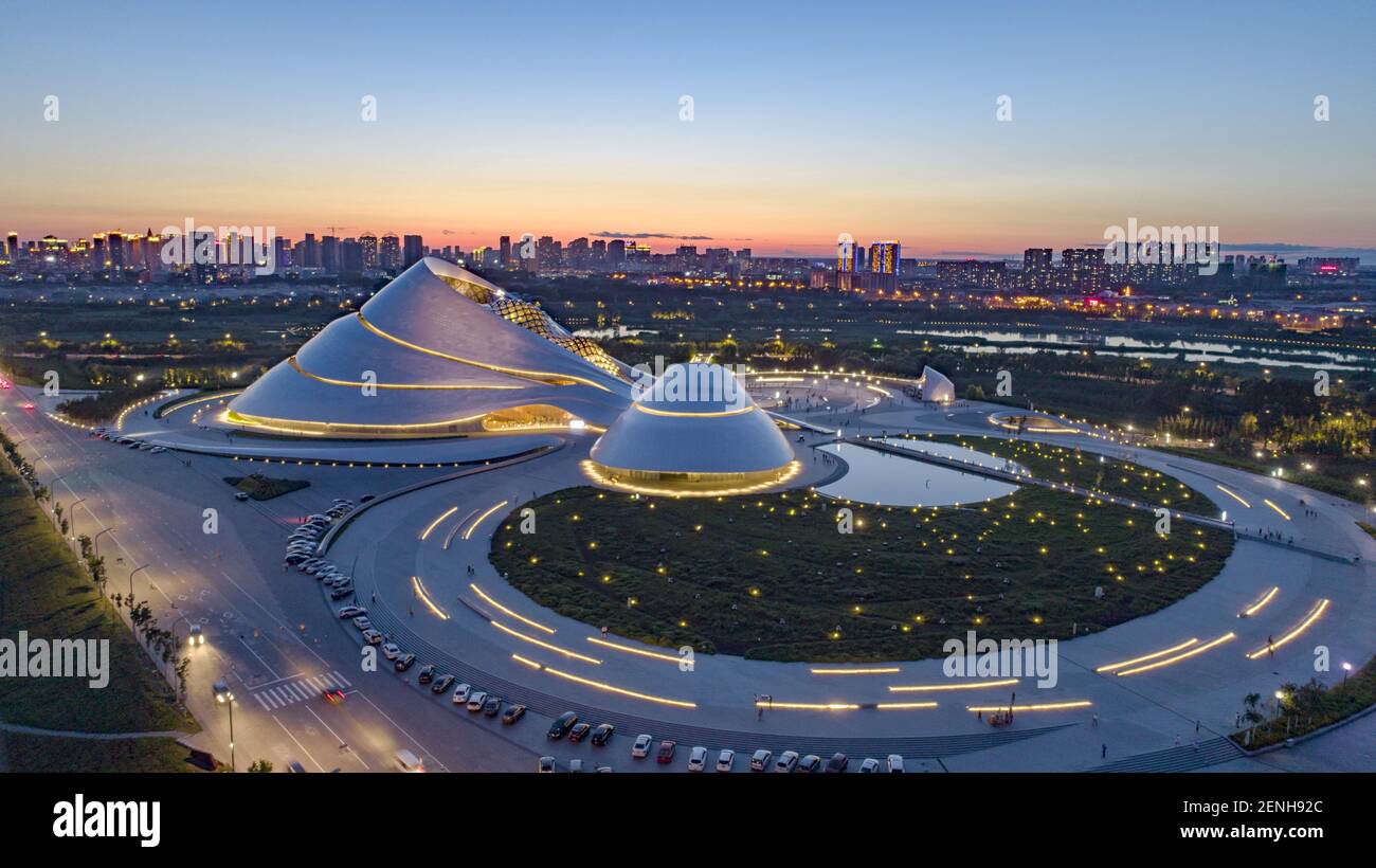 A view at night of Harbin Opera House or Harbin Grand Theater in Harbin ...