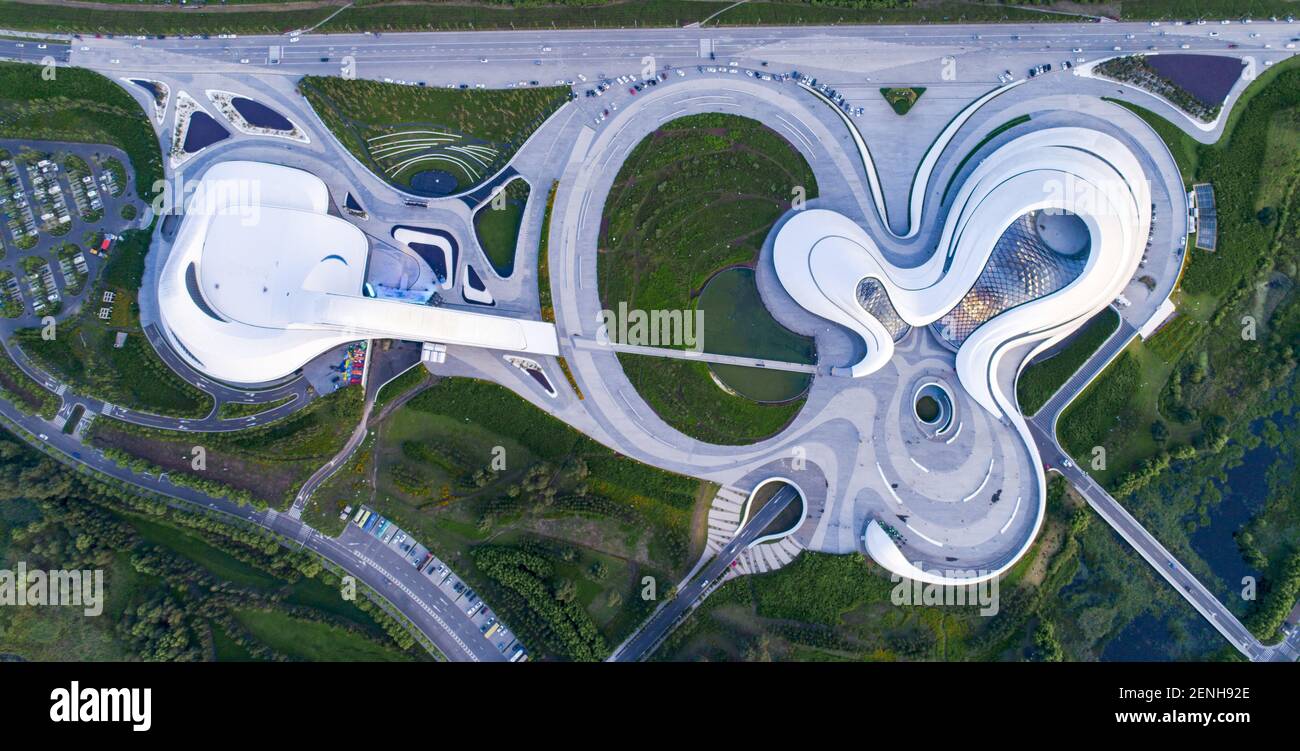 An aerial view at sunset of Harbin Opera House or Harbin Grand Theater ...