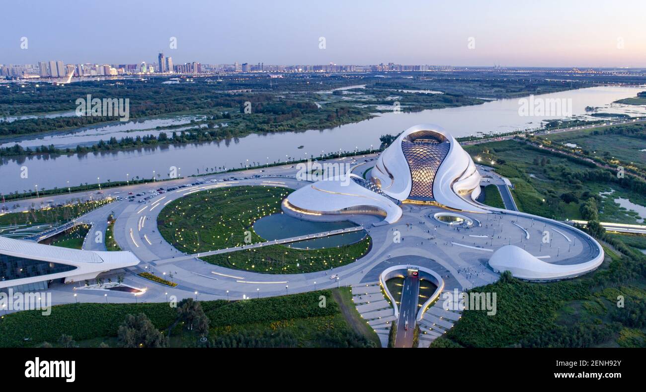 An aerial view at sunset of Harbin Opera House or Harbin Grand Theater ...