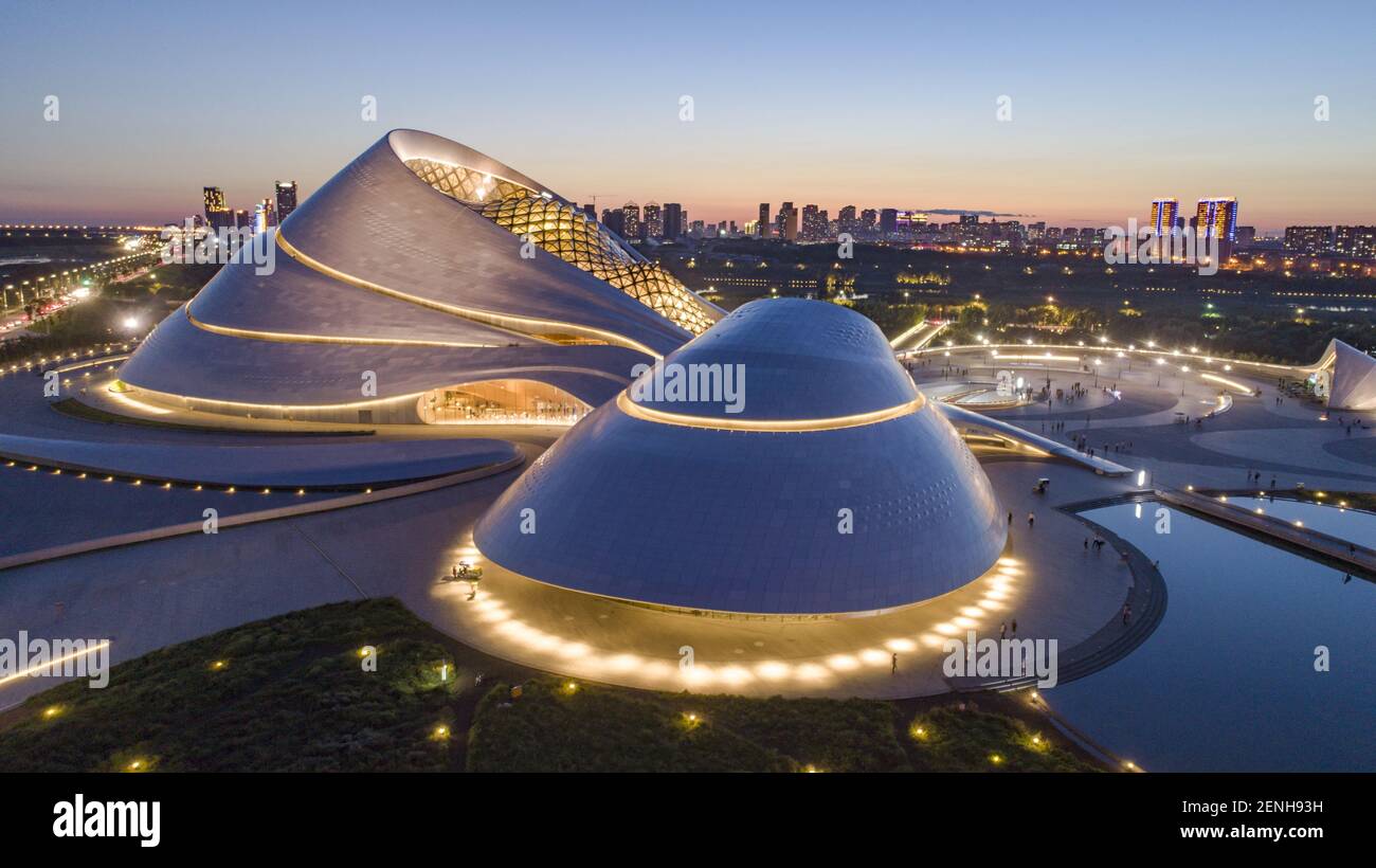 A view at night of Harbin Opera House or Harbin Grand Theater in Harbin ...