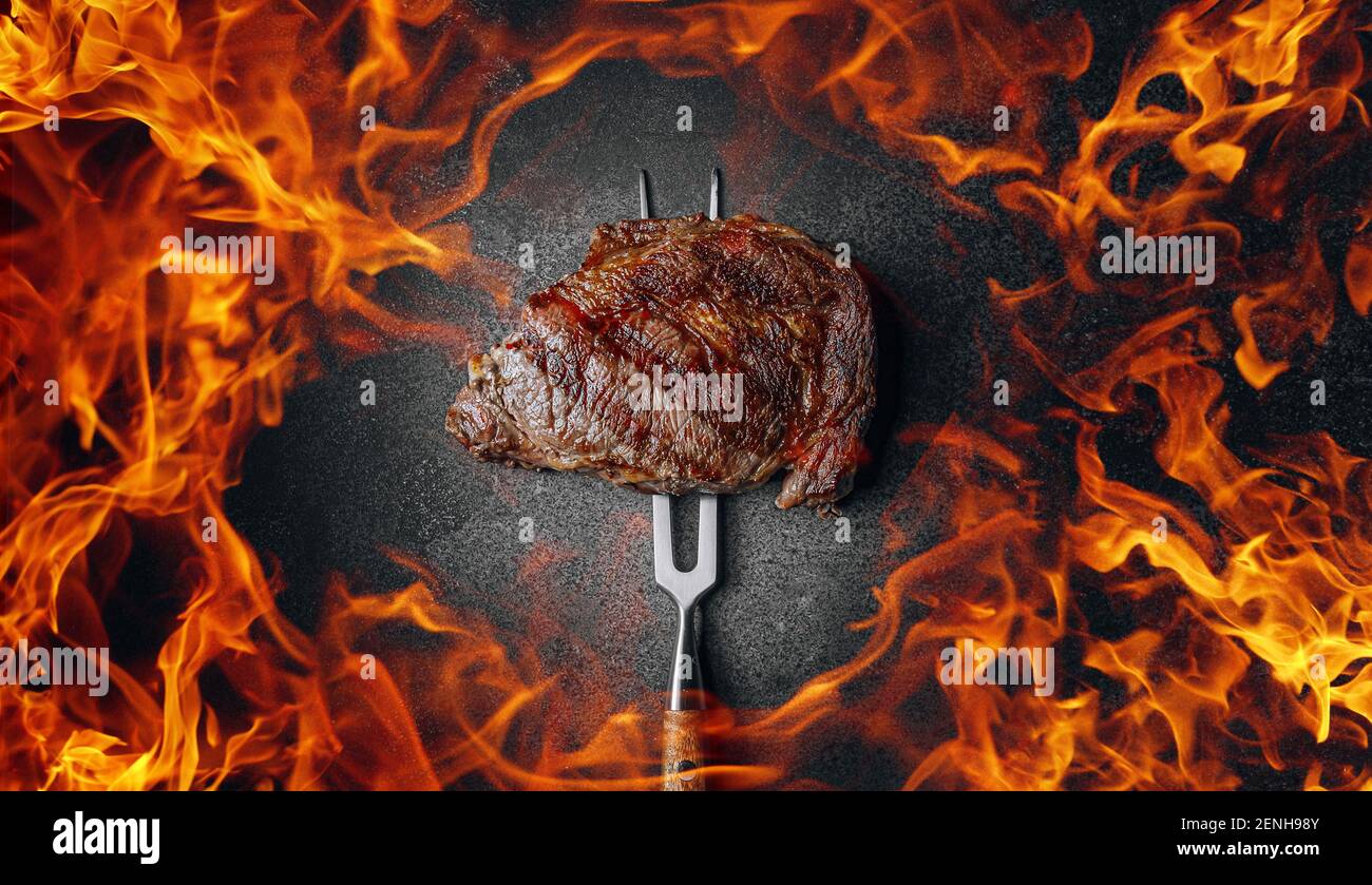 grilled marbled beef steak and fire Stock Photo - Alamy