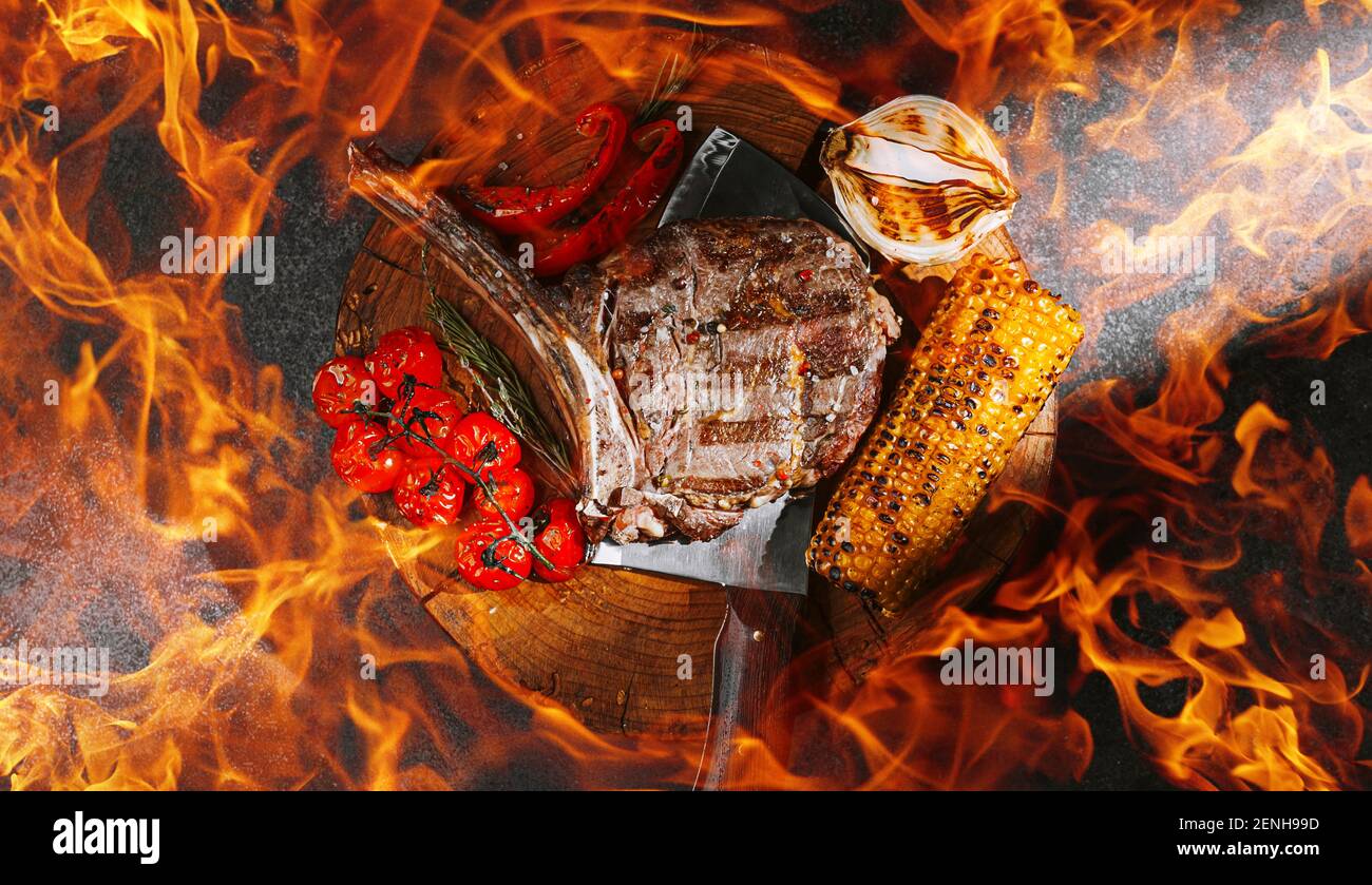 grilled marbled beef steak and fire Stock Photo - Alamy