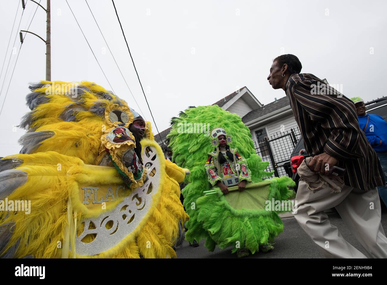 Black Masking Indians (Mardi Gras Indians), adorned in vibrant ...
