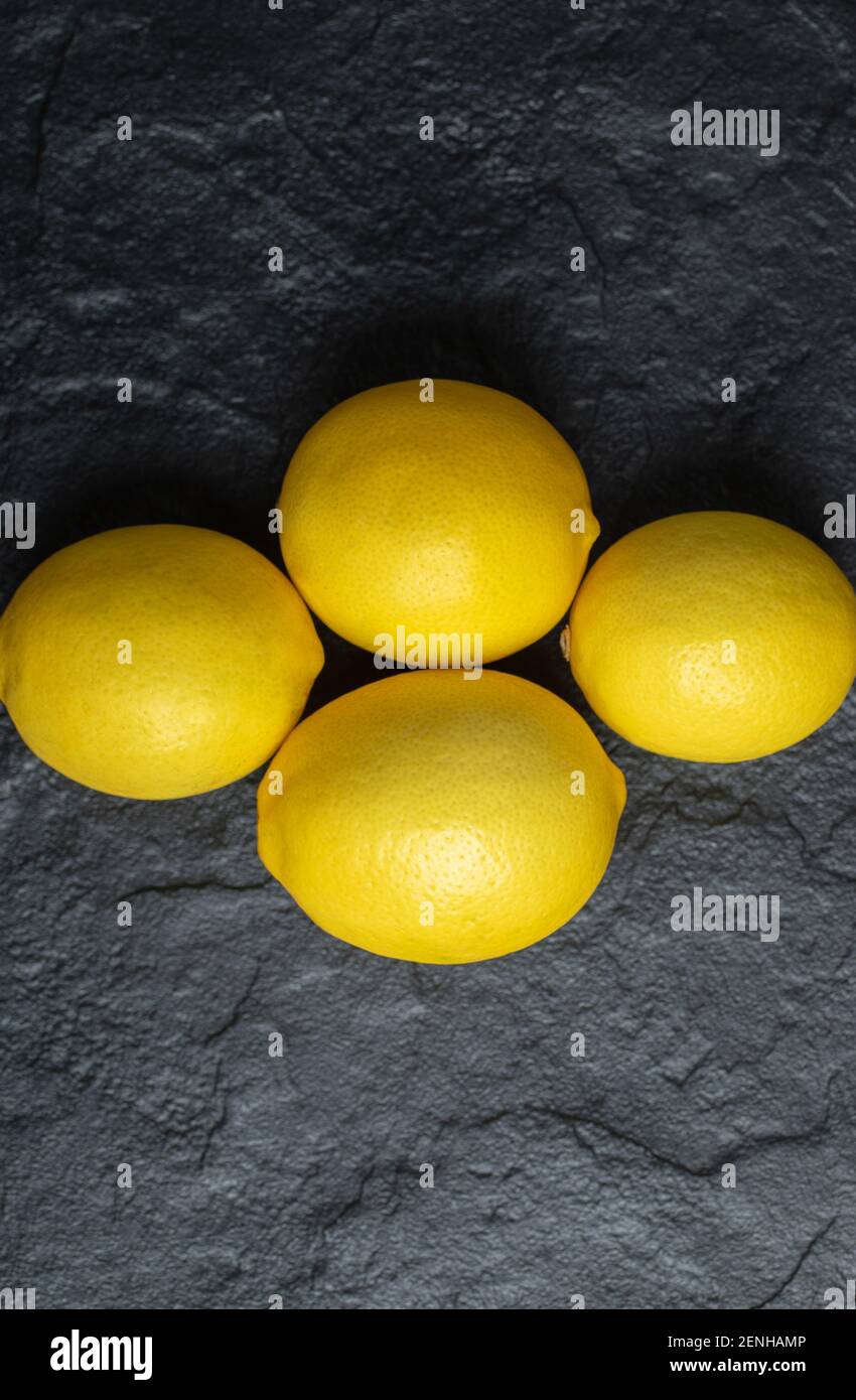 Vertical photo of ripe juicy lemons Stock Photo - Alamy
