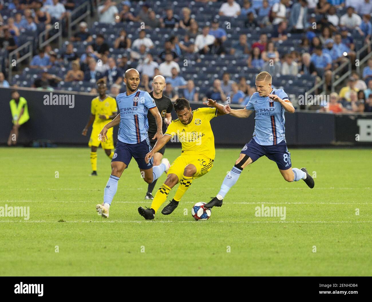 Eduardo Sosa (20) of Columbus Crew SC & Alexander RIng (8) fight for ...