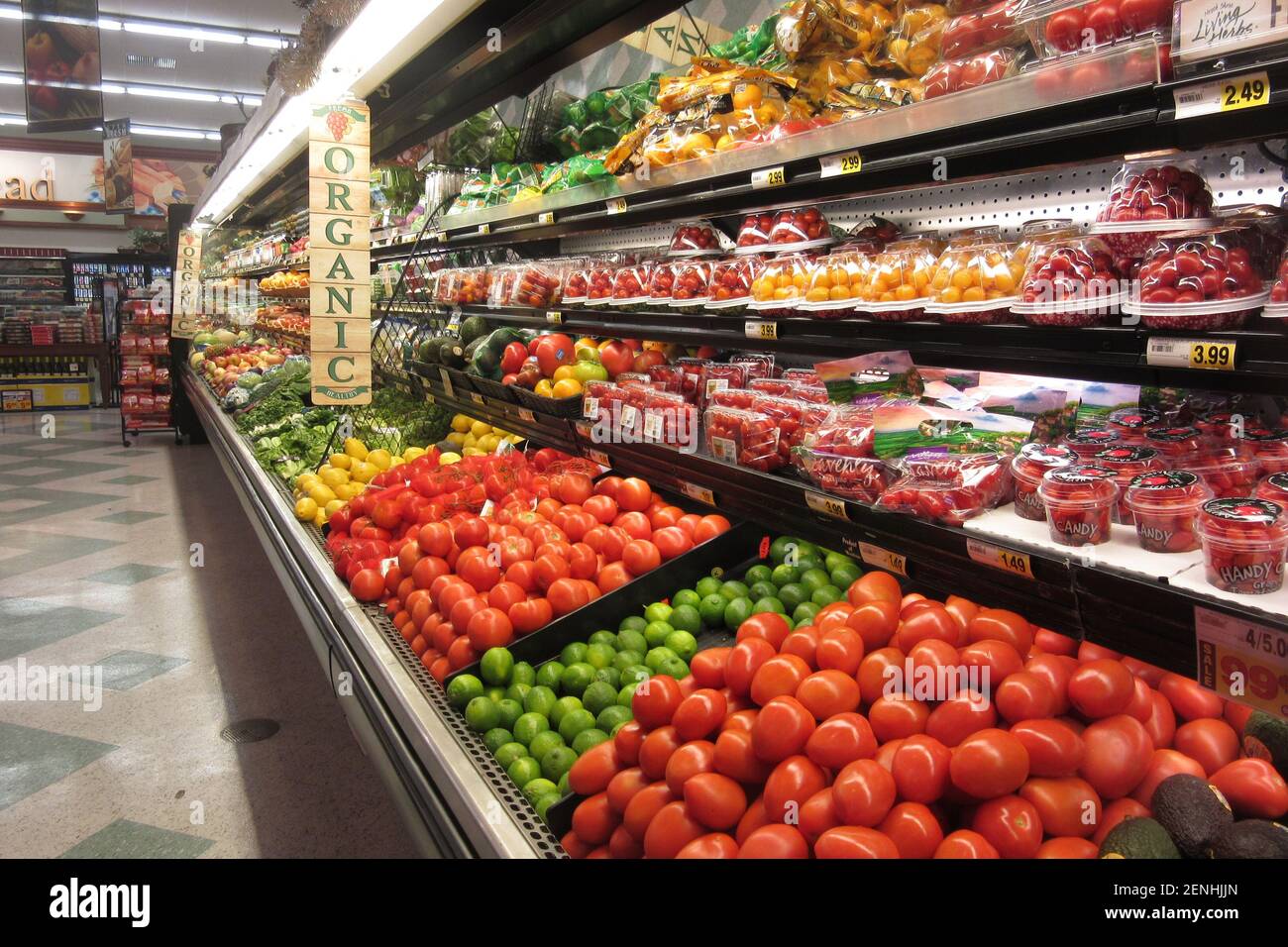 Variety of organic and fresh fruits on the shelves in a supermarket ...