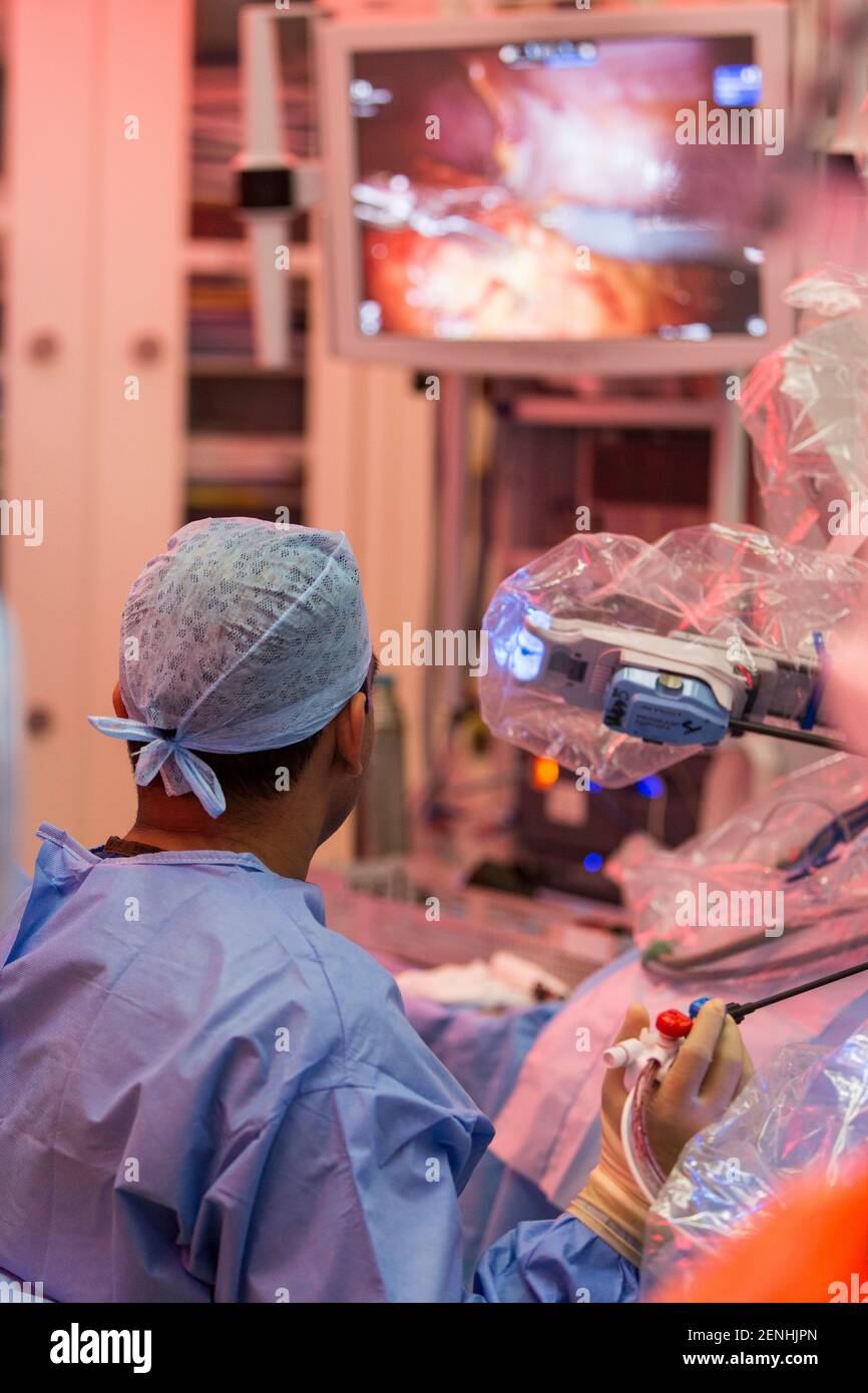 Surgeons perform an operation at an operating theatre hi-res stock ...