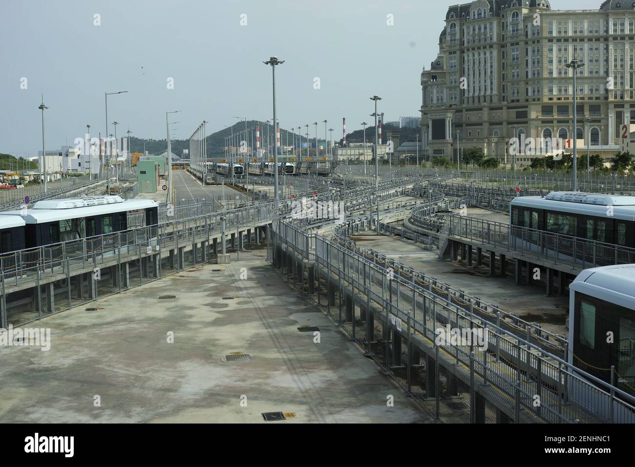 Chinese workers introduce the Light Rail Transit (LRT) system at the ...