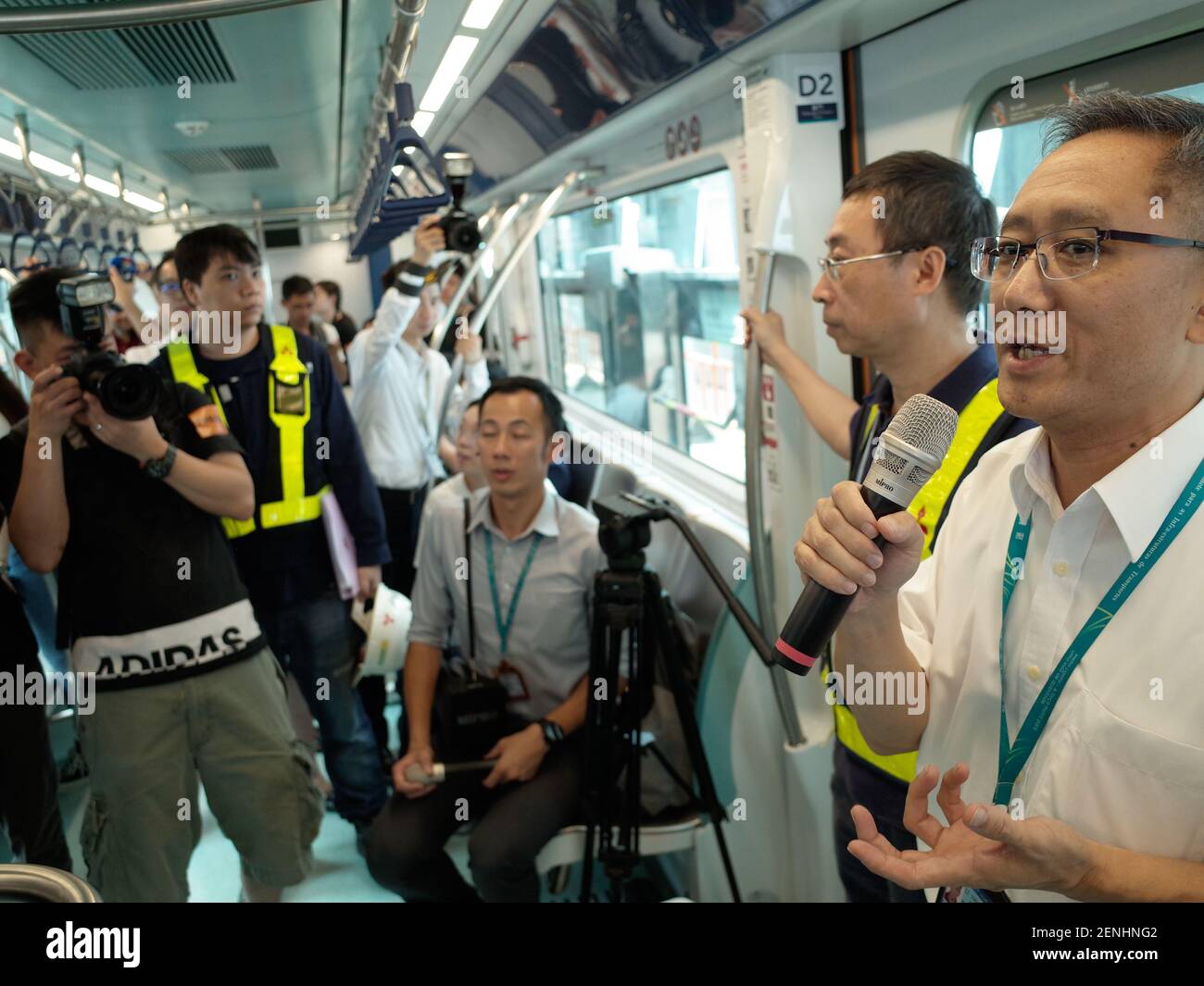 Chinese workers introduce the Light Rail Transit (LRT) system at the ...