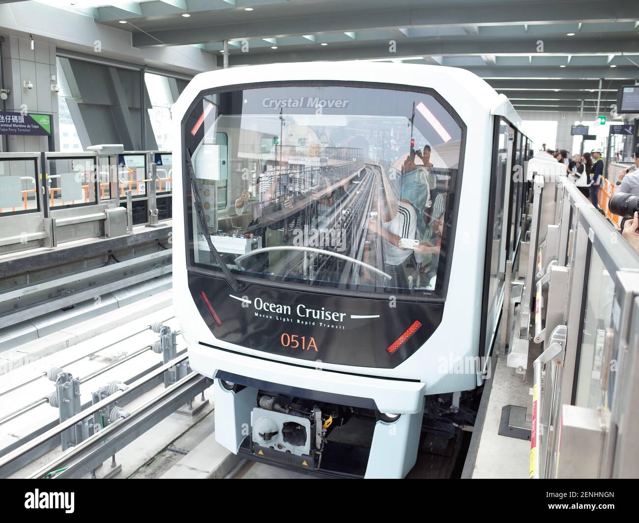 Chinese workers introduce the Light Rail Transit (LRT) system at the ...