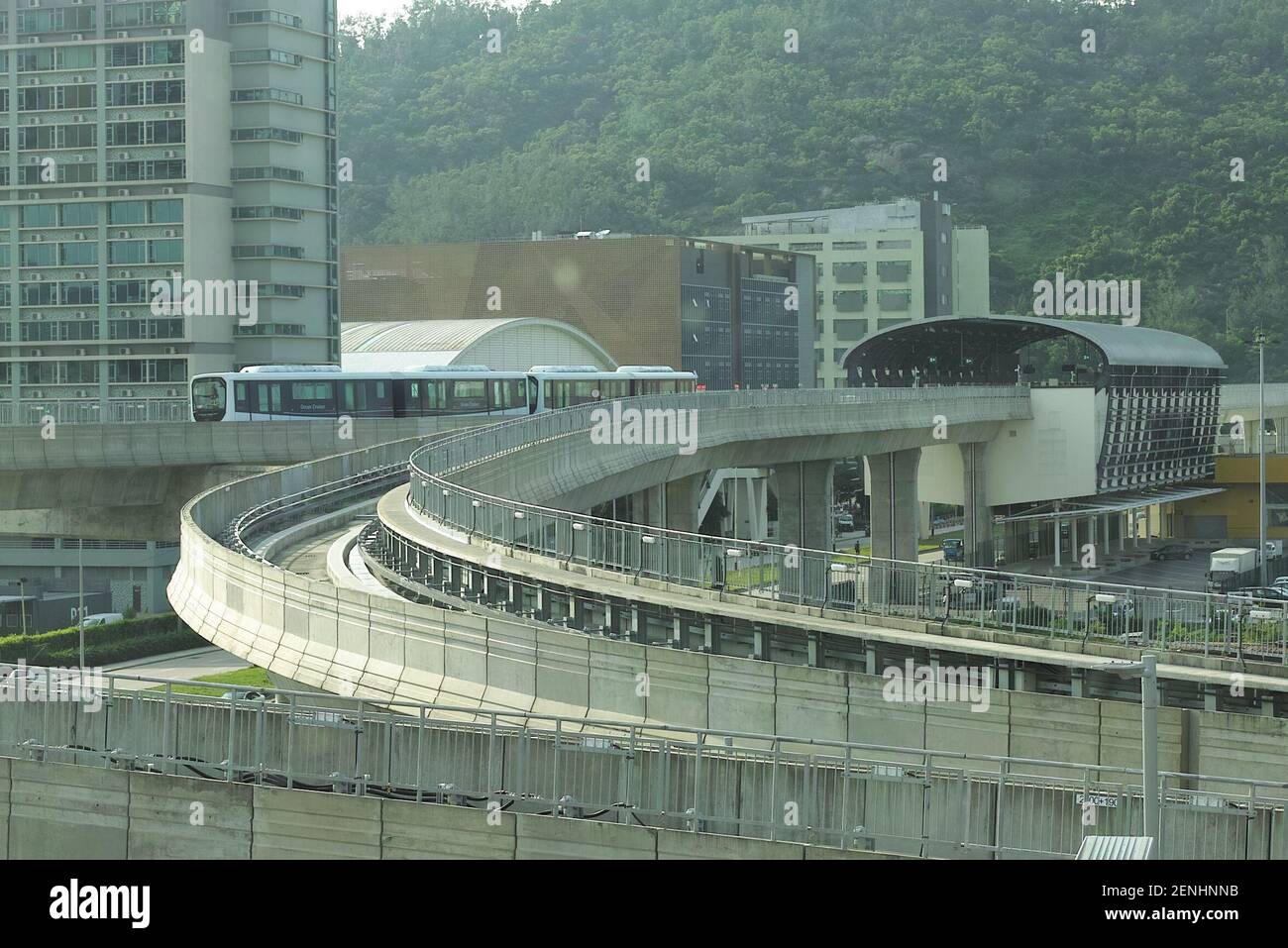 Chinese workers introduce the Light Rail Transit (LRT) system at the ...
