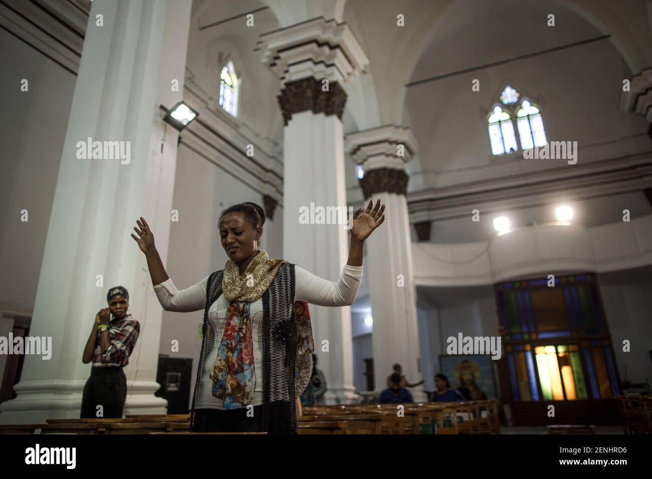 23 August 2019, Libya, Tripoli: A Christian woman prays during a ...