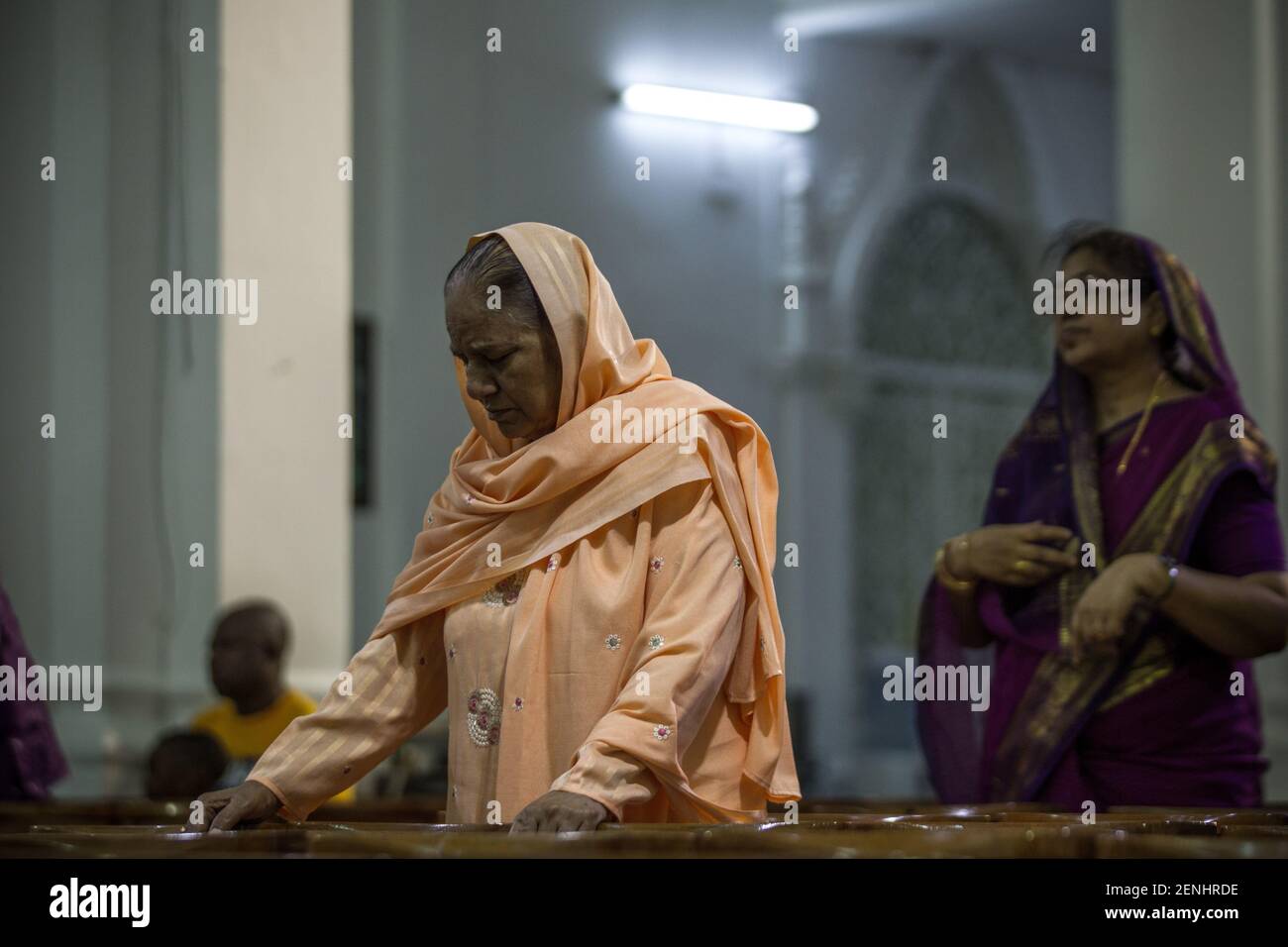 23 August 2019, Libya, Tripoli: Christian women pray during a service ...