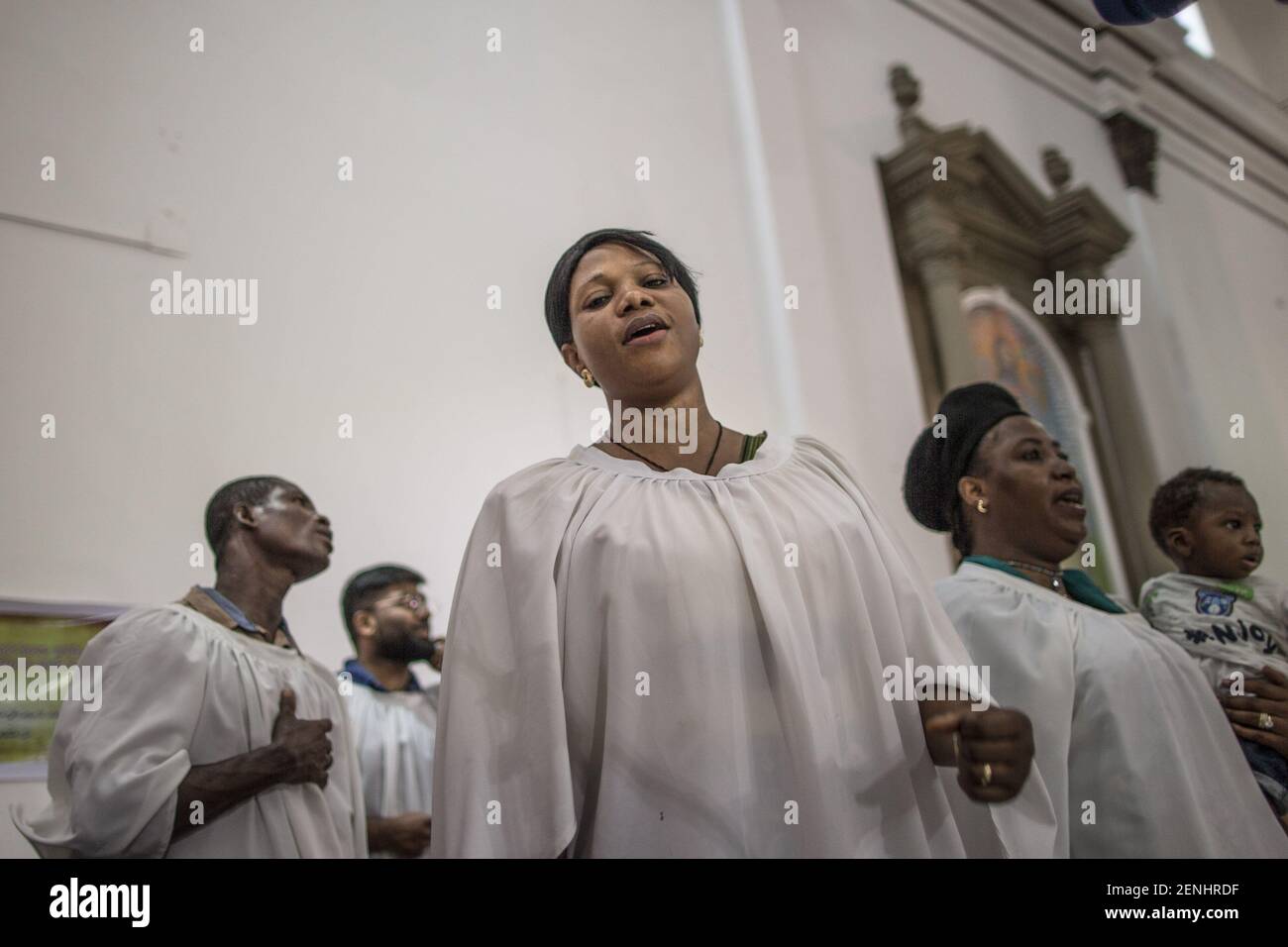 23 August 2019, Libya, Tripoli: Christian women sing during a service ...