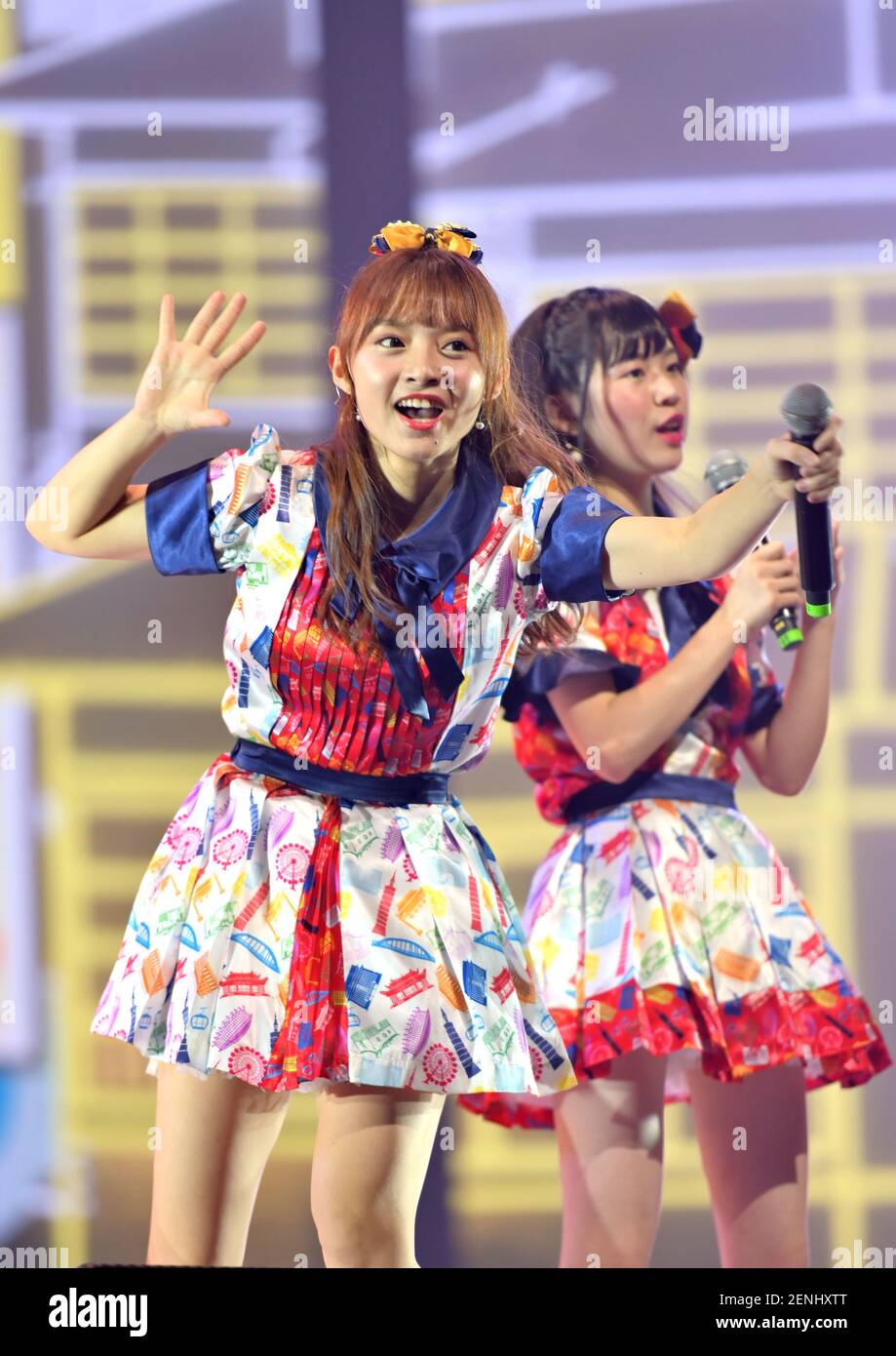 Members of Japanese idol girl group AKB48 and its international sister ...