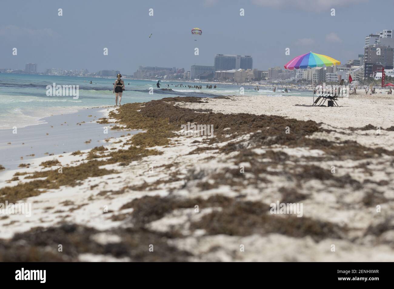CANCUN, MEXICO - AUGUST 24: Tourist are seen on the beach contaminated ...