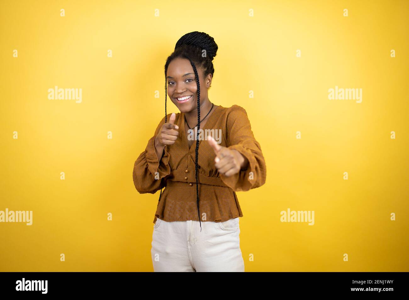African American Woman Wearing Casual Clothes Pointing To You And The