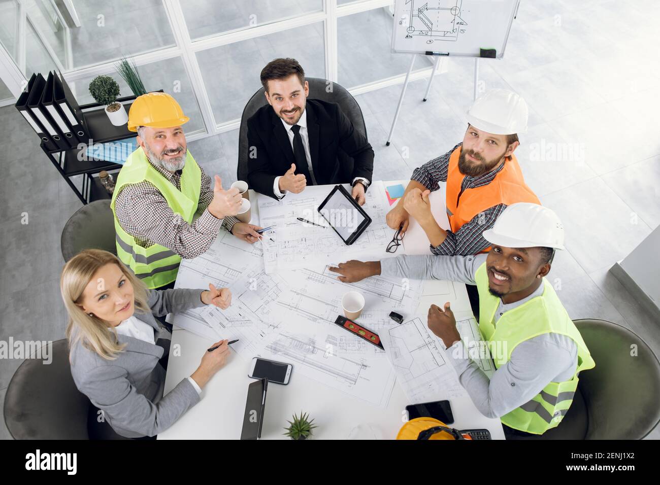 Construction team planning arrangement of service lines Stock Photo - Alamy
