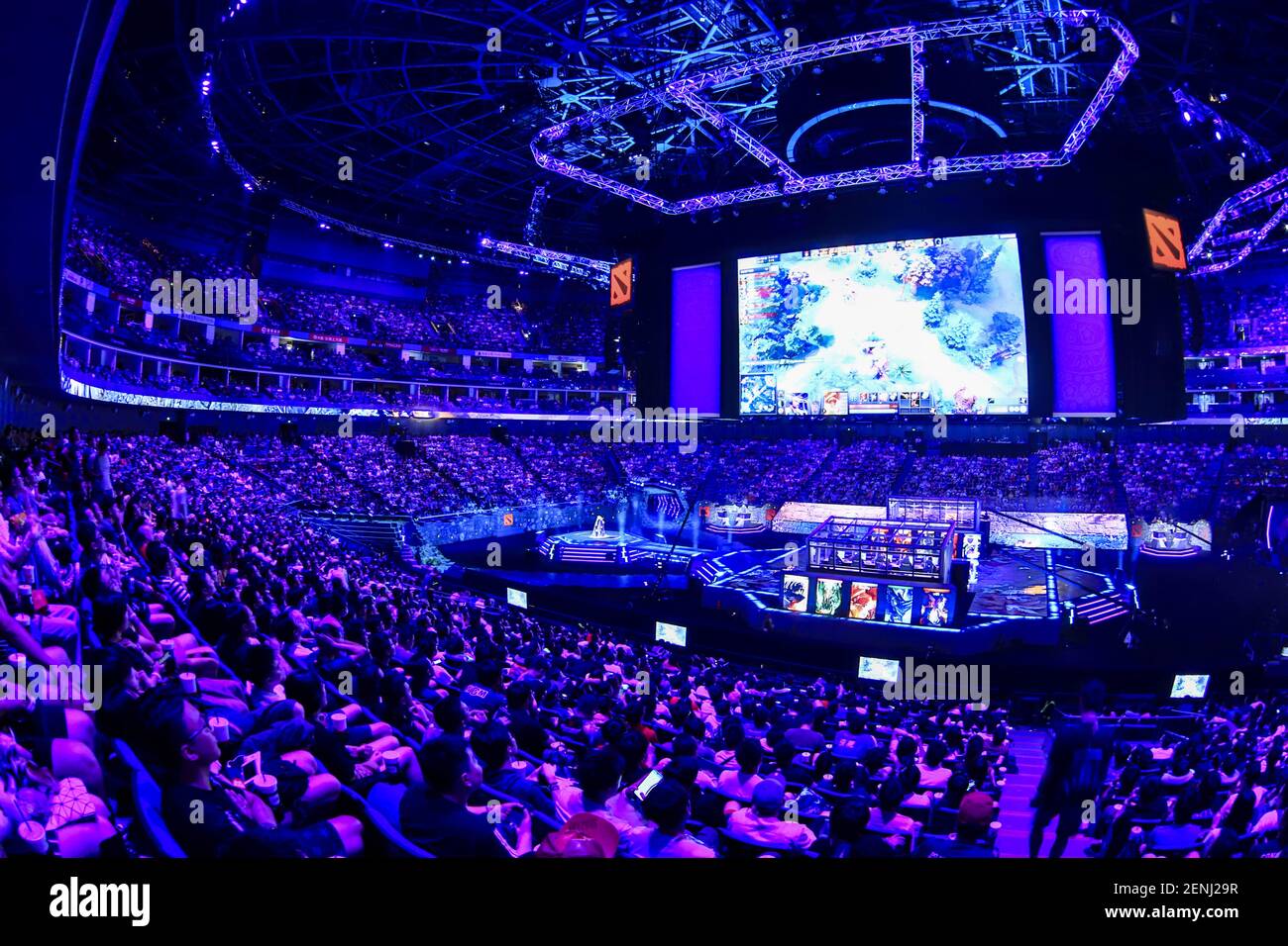 Players compete in the Dota 2 International game during the TI9 grand final match in Shanghai ...