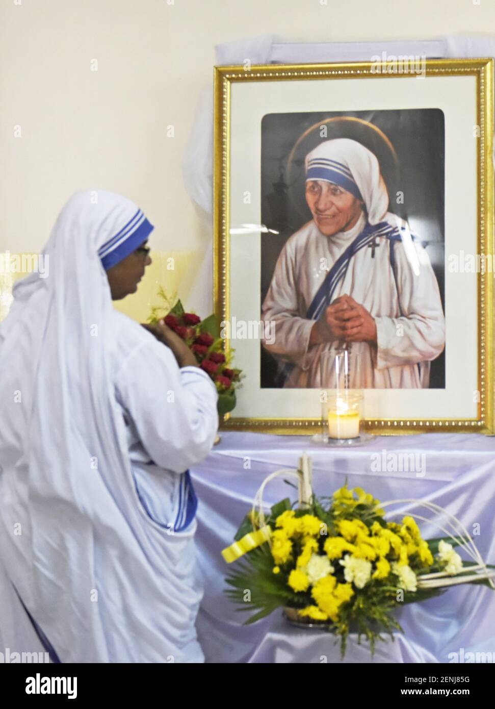 A nun from the Catholic Order of the Missionaries of Charity stands in ...