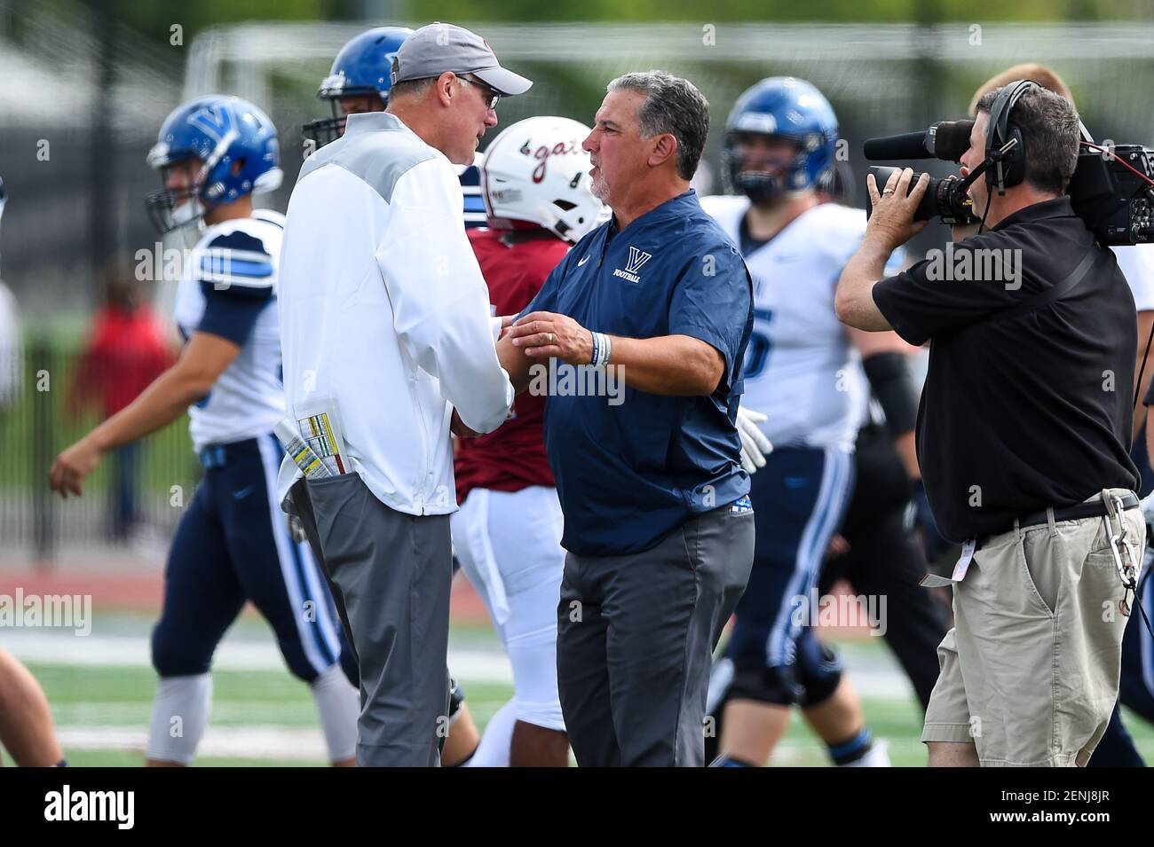 August 24, 2019: Colgate Raiders head coach Dan Hunt (left) and ...