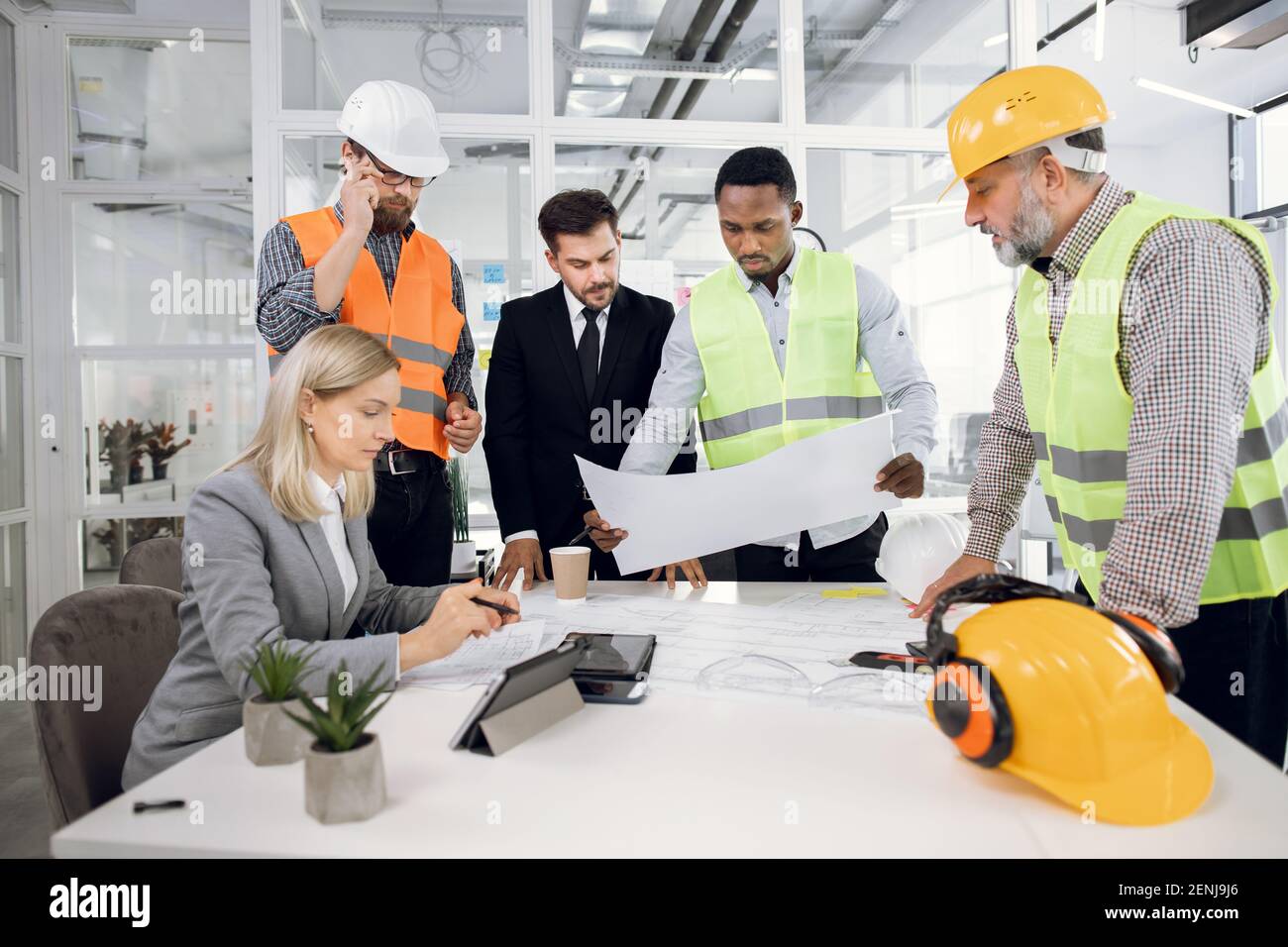 Diverse high-skilled multiethnic people creating project of building ...