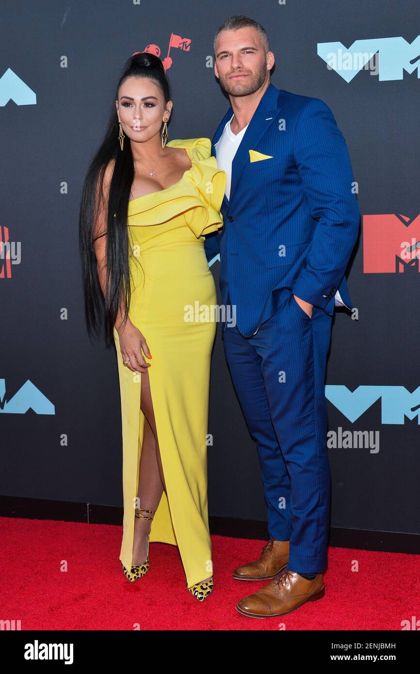 Jenni Farley JWoww and Roger Mathews arriving on the red carpet at the ...