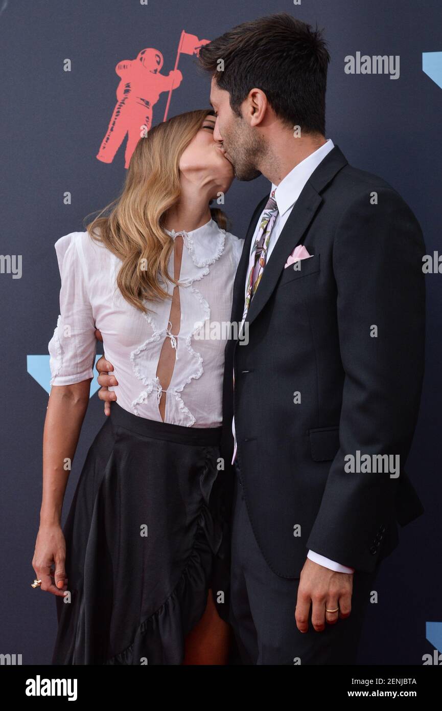 Laura Schulman, Nev Schulman arriving on the red carpet at the 2019 MTV ...