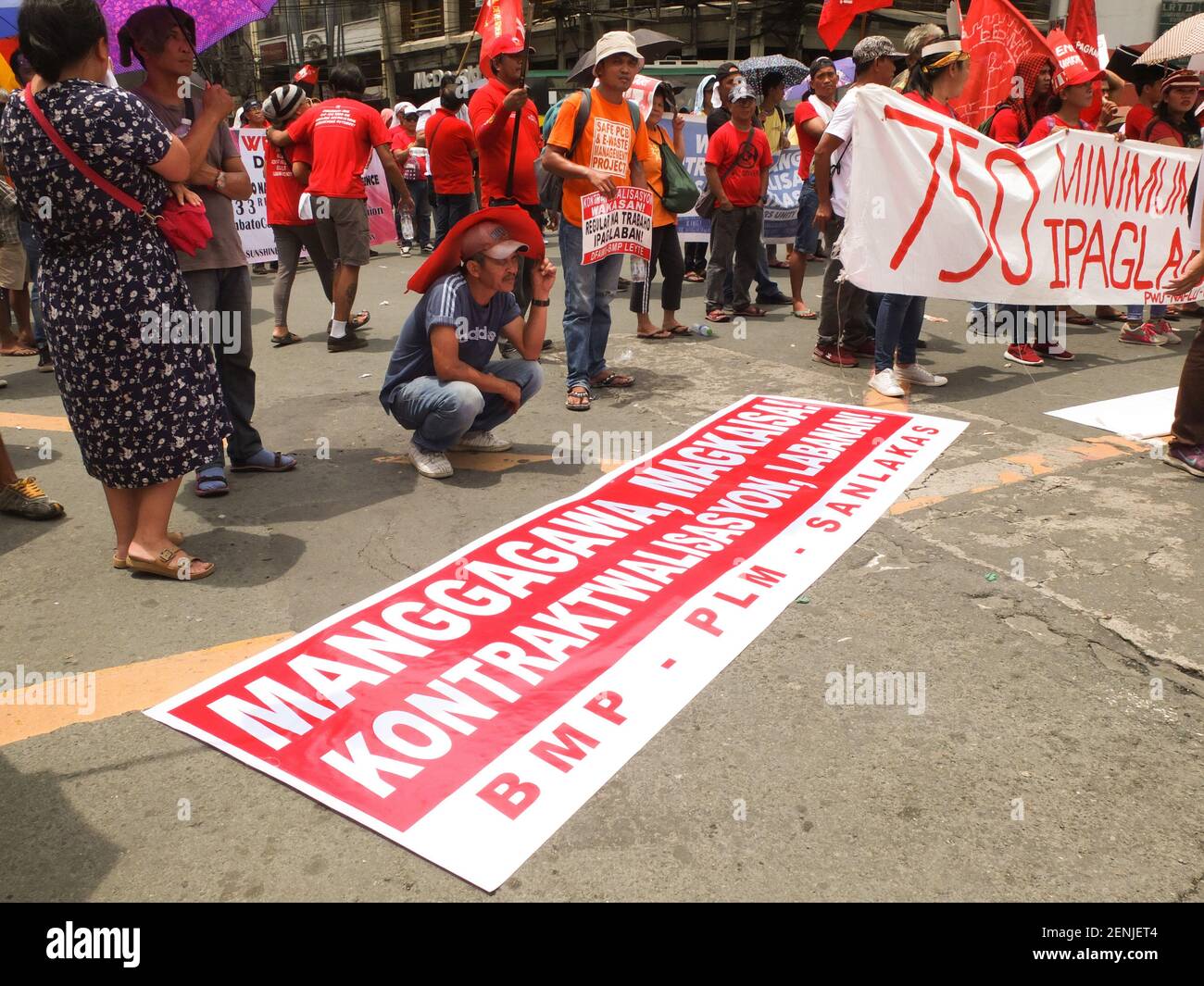 A huge lays on the ground during the demonstration. Thousands of ...