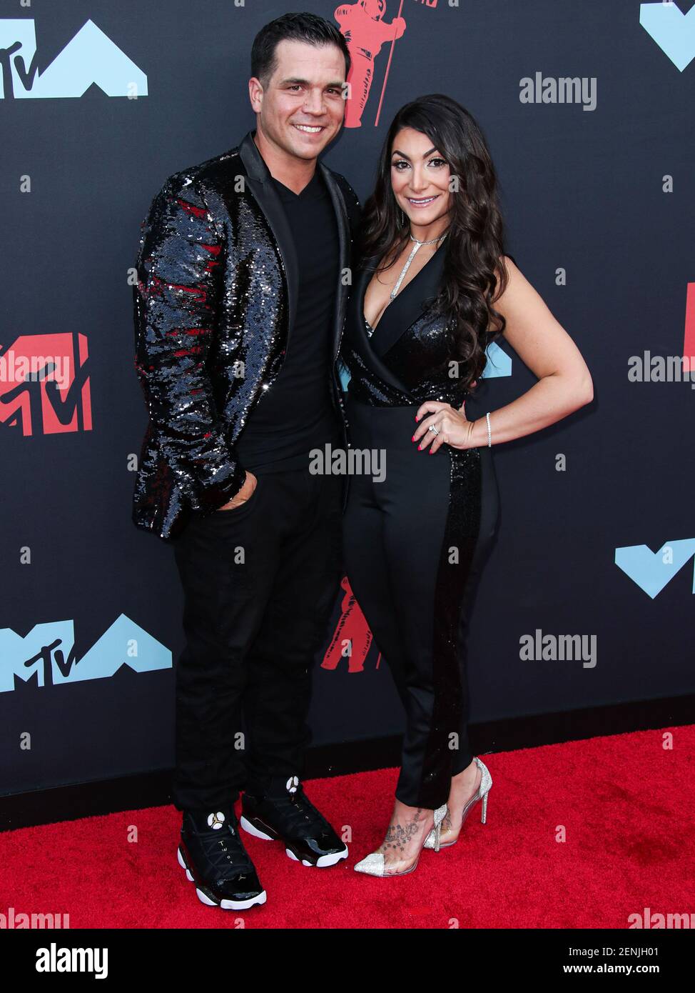 NEWARK, NEW JERSEY, USA - AUGUST 26: Chris Buckner and Deena Nicole ...