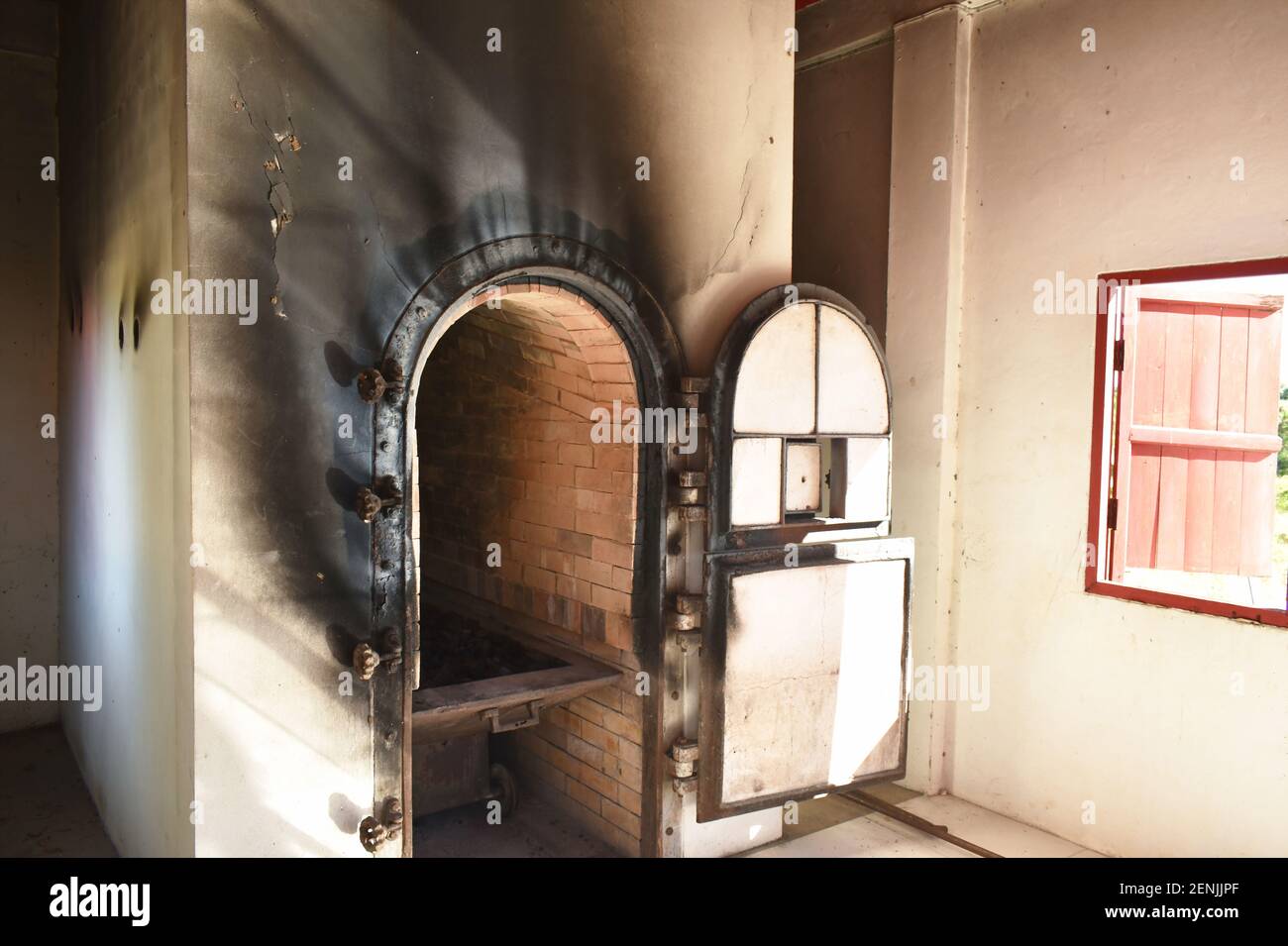 door for push wooden coffin to burning in cremation furnace building ...