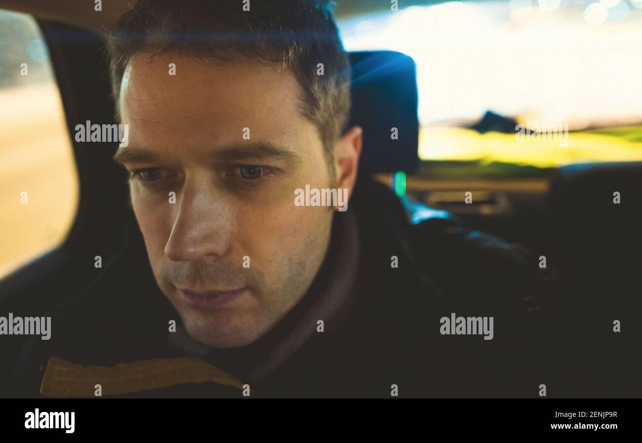 Portrait of a man inside the car Stock Photo - Alamy