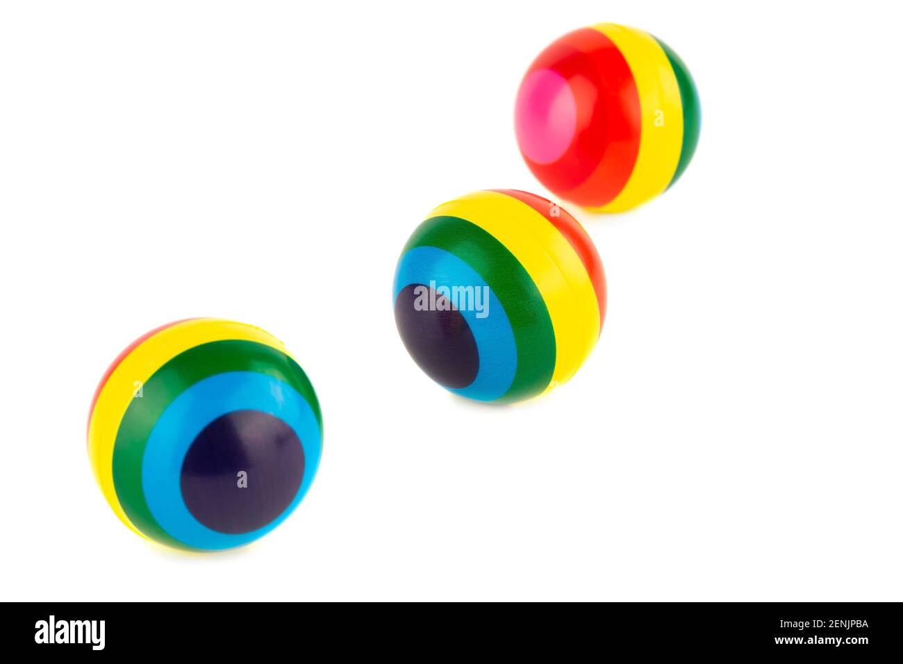 Three colorful balls isolated on white background Stock Photo - Alamy