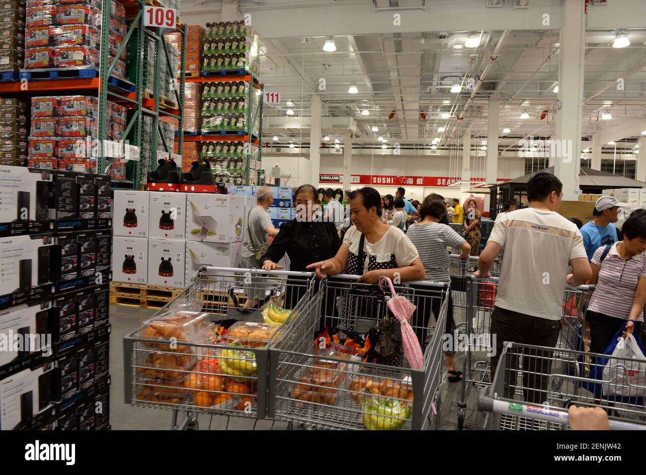 Chinese customers shop at the Costco store in Shanghai, China on August ...