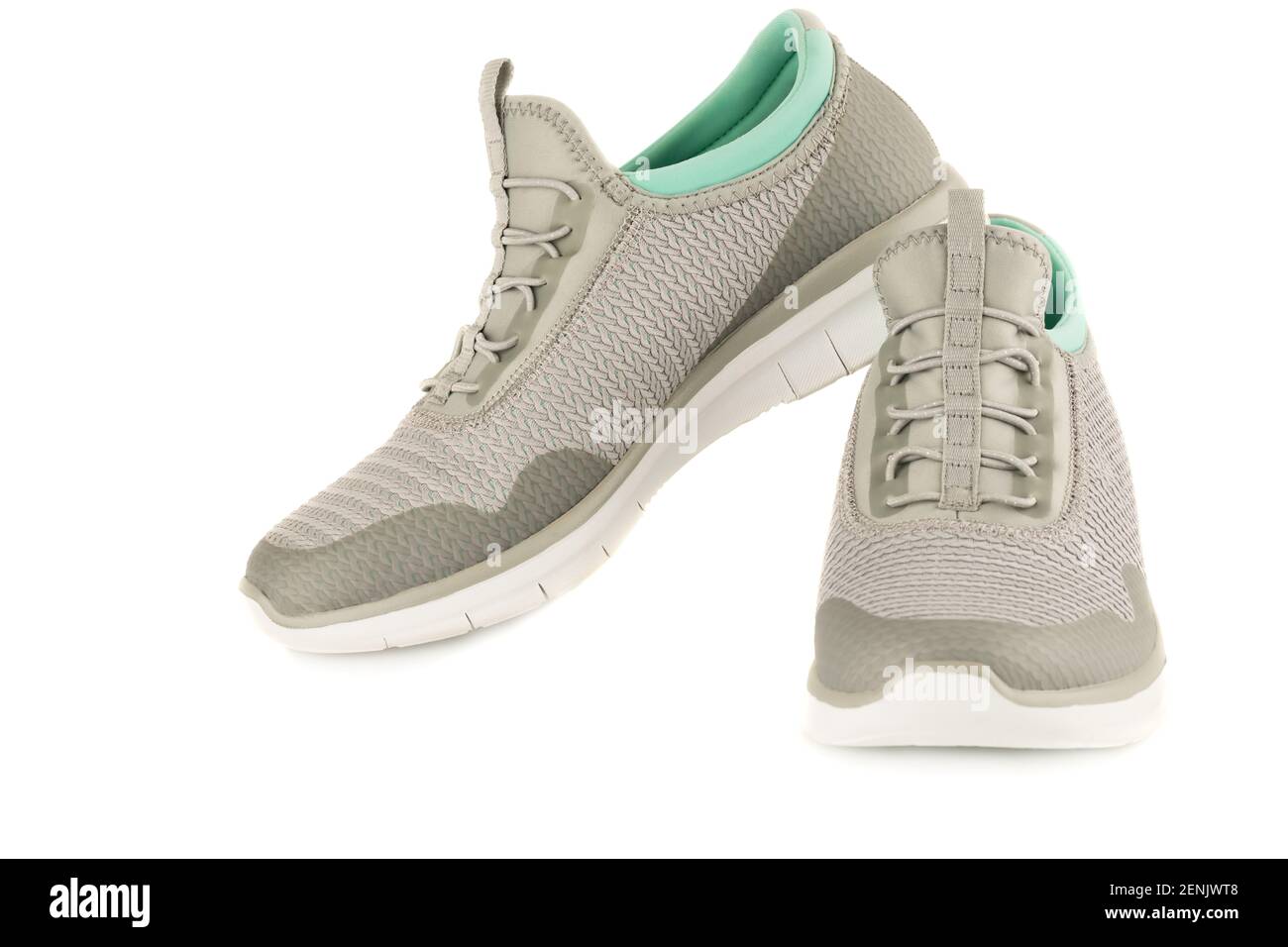 The pair of sport shoes isolated on white background Stock Photo - Alamy