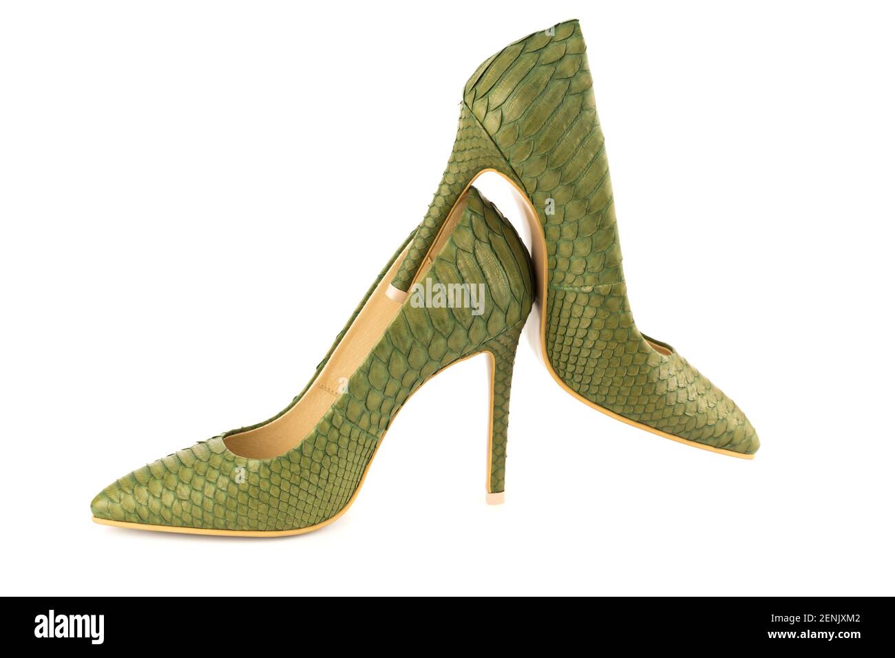 The pair of stylish high heels python leather shoes isolated on white ...